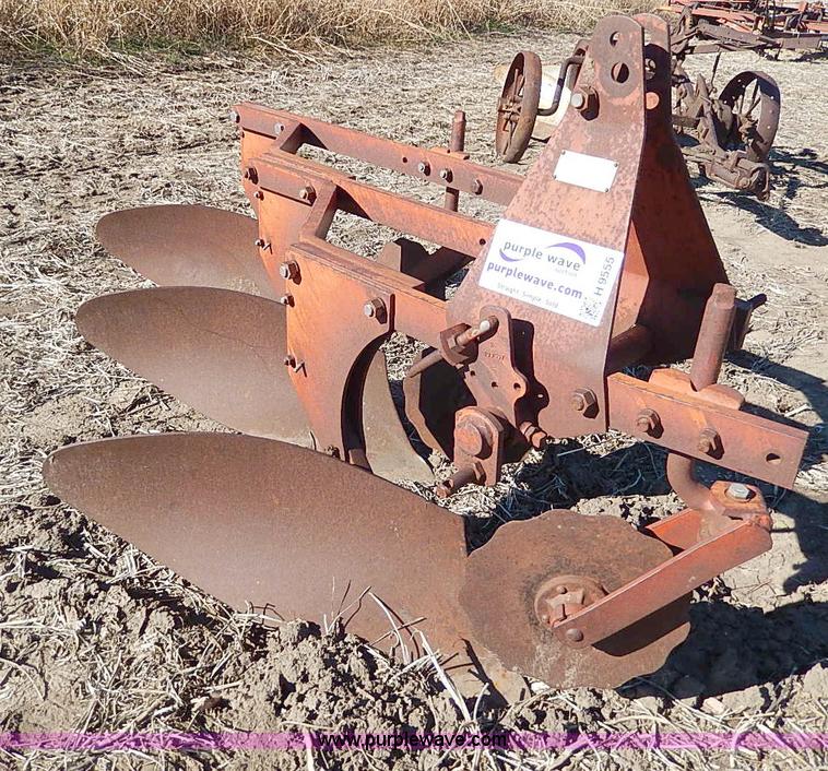 Ford IOI three bottom plow in Beloit, KS | Item H9555 sold | Purple Wave