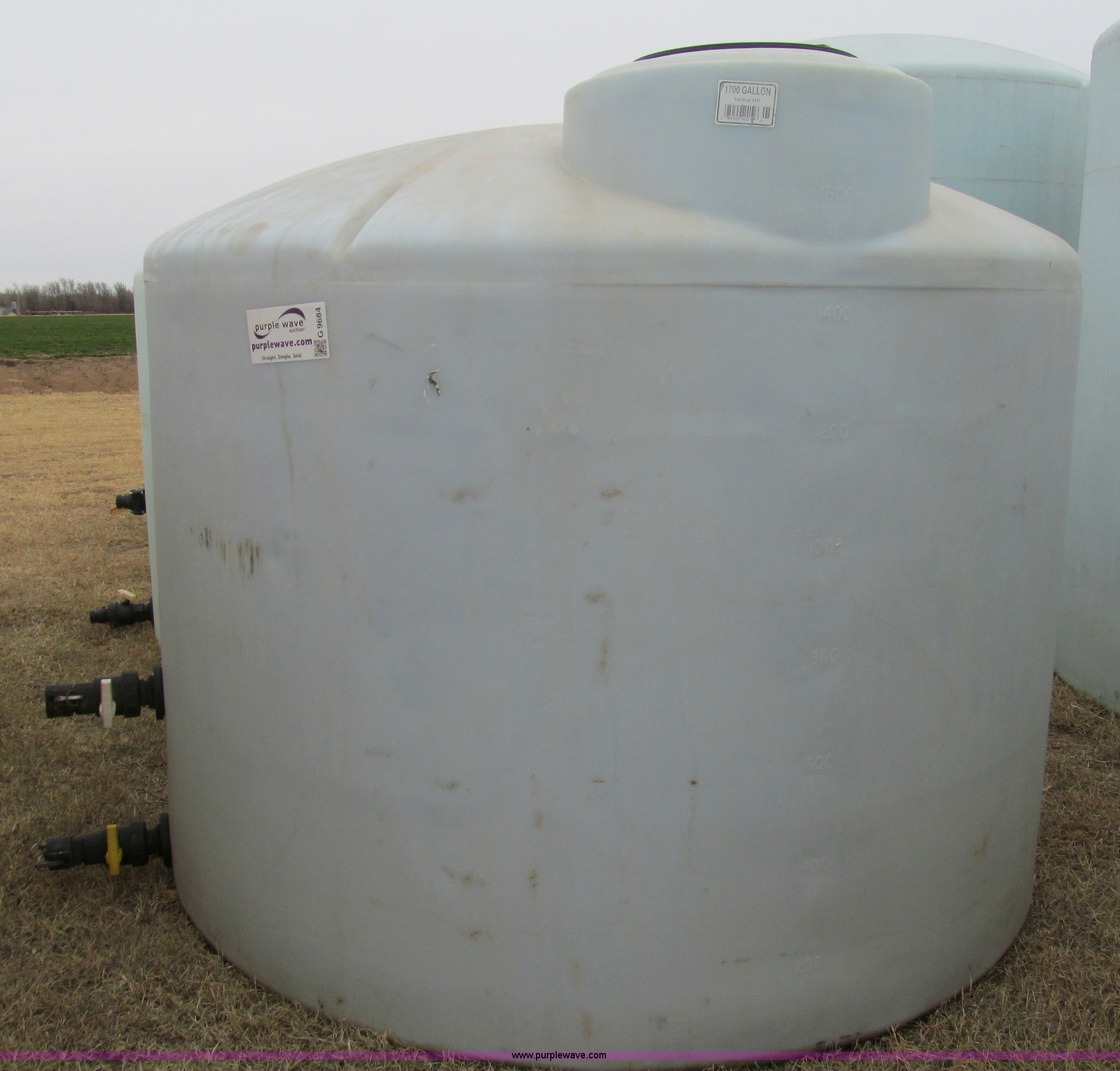 1700 gallon vertical poly tank in Lyons, KS | Item G9684 sold | Purple Wave