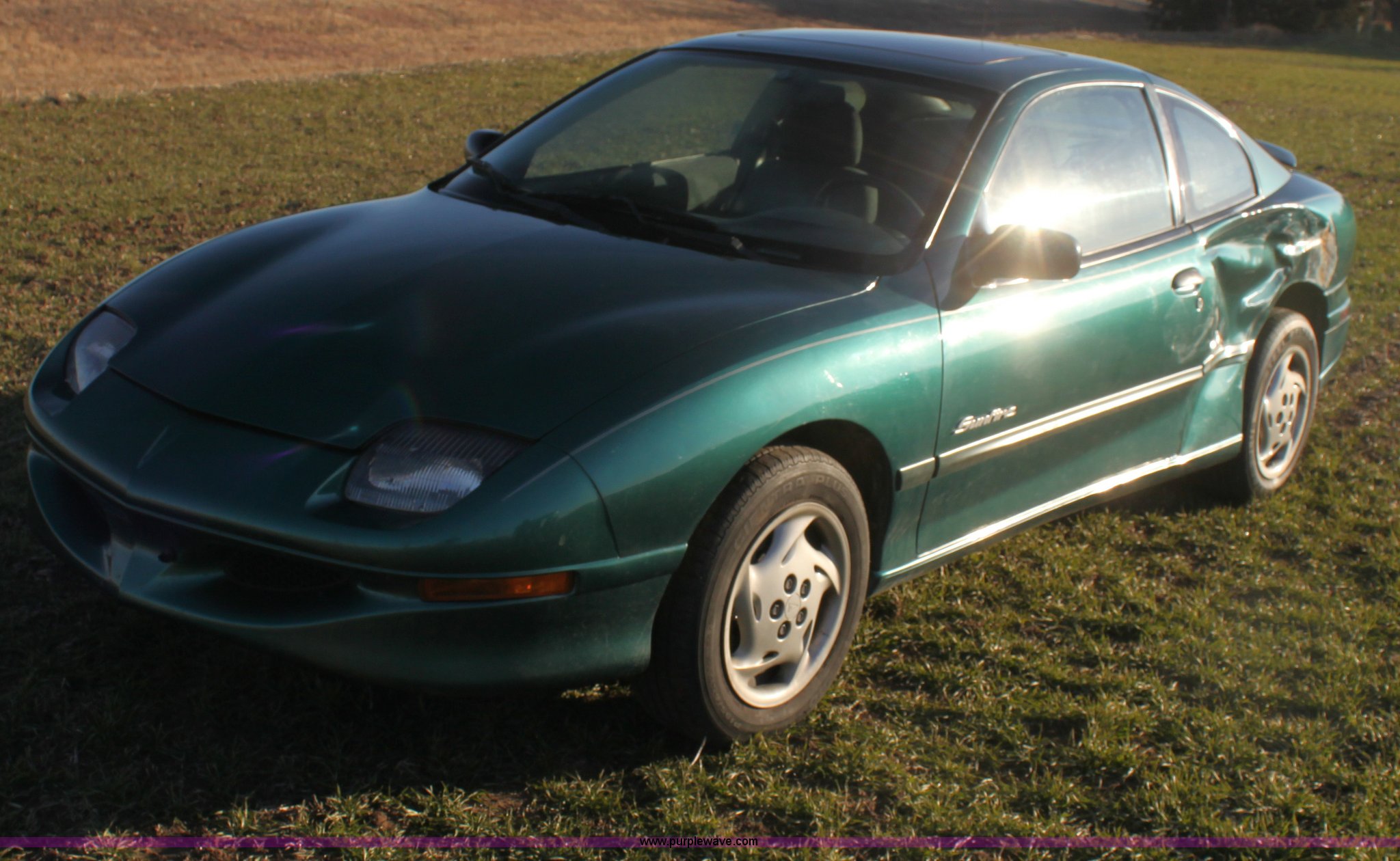 1999 Pontiac Sunfire SE in Udall, KS | Item AE9086 sold | Purple Wave