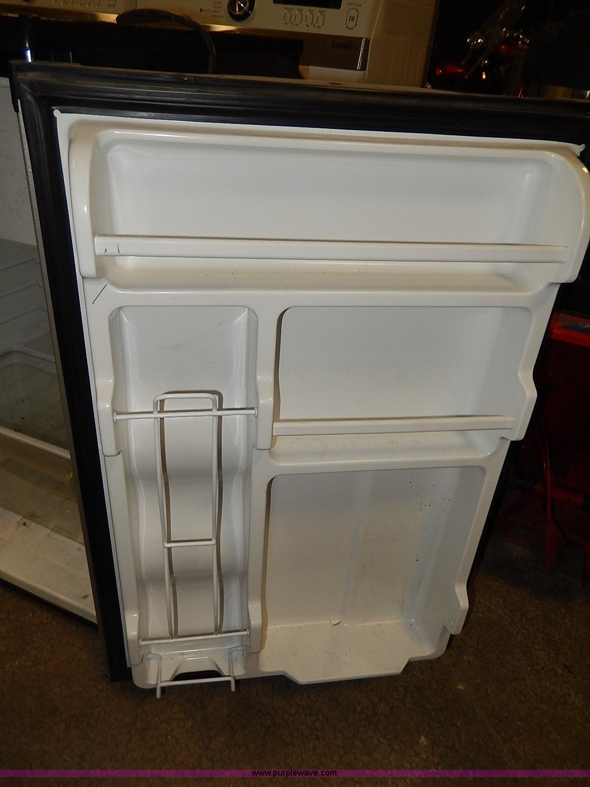 Frigidaire mini fridge in Manhattan, KS | Item AX9179 sold | Purple Wave
