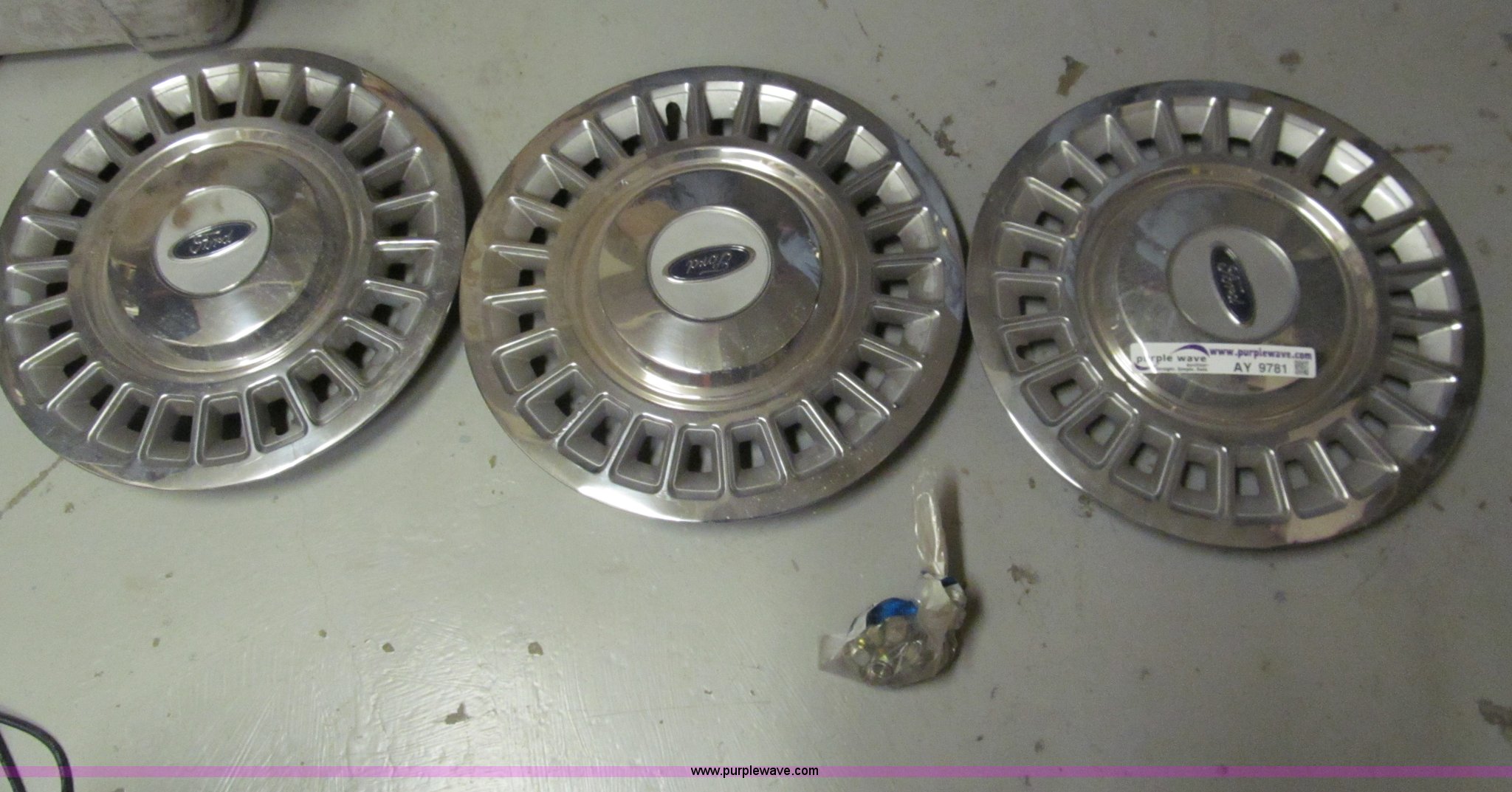 (3) Ford hubcaps in Hoisington, KS | Item AY9781 sold | Purple Wave