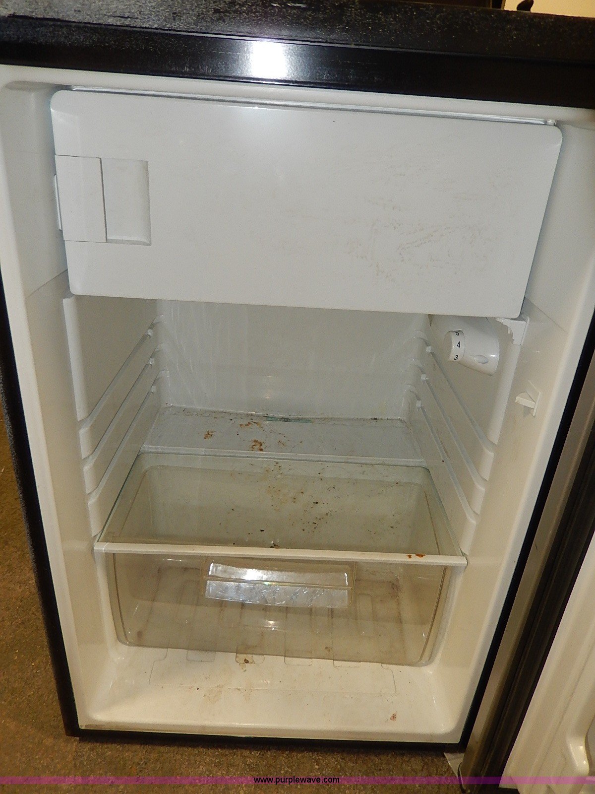 Frigidaire mini fridge in Manhattan, KS | Item AX9179 sold | Purple Wave