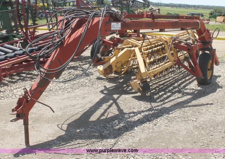 New Holland 216 twin hay rake in Emporia, KS | Item I7314 sold | Purple ...