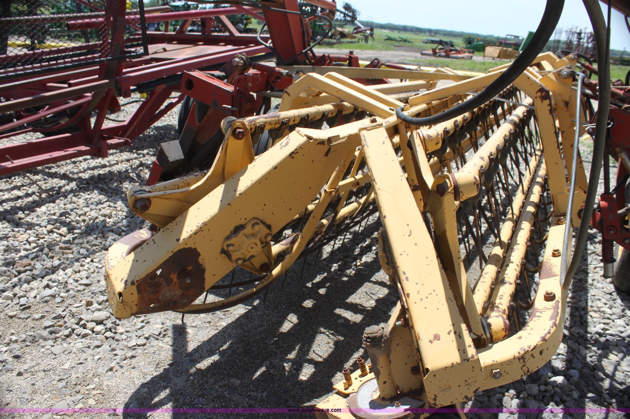 New Holland 216 twin hay rake in Emporia, KS | Item I7314 sold | Purple ...