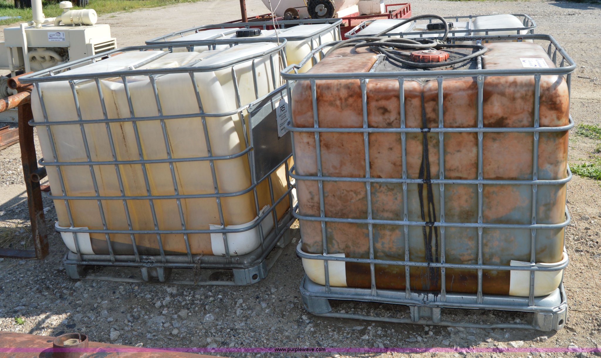 (4) 250 gallon oil totes in Odessa, MO | Item I4666 sold | Purple Wave