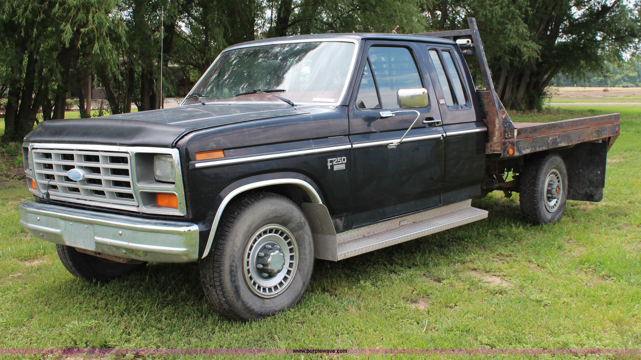 1985 Ford F250 Ext. Cab flatbed truck in Lawrence, KS | Item BA9177 ...