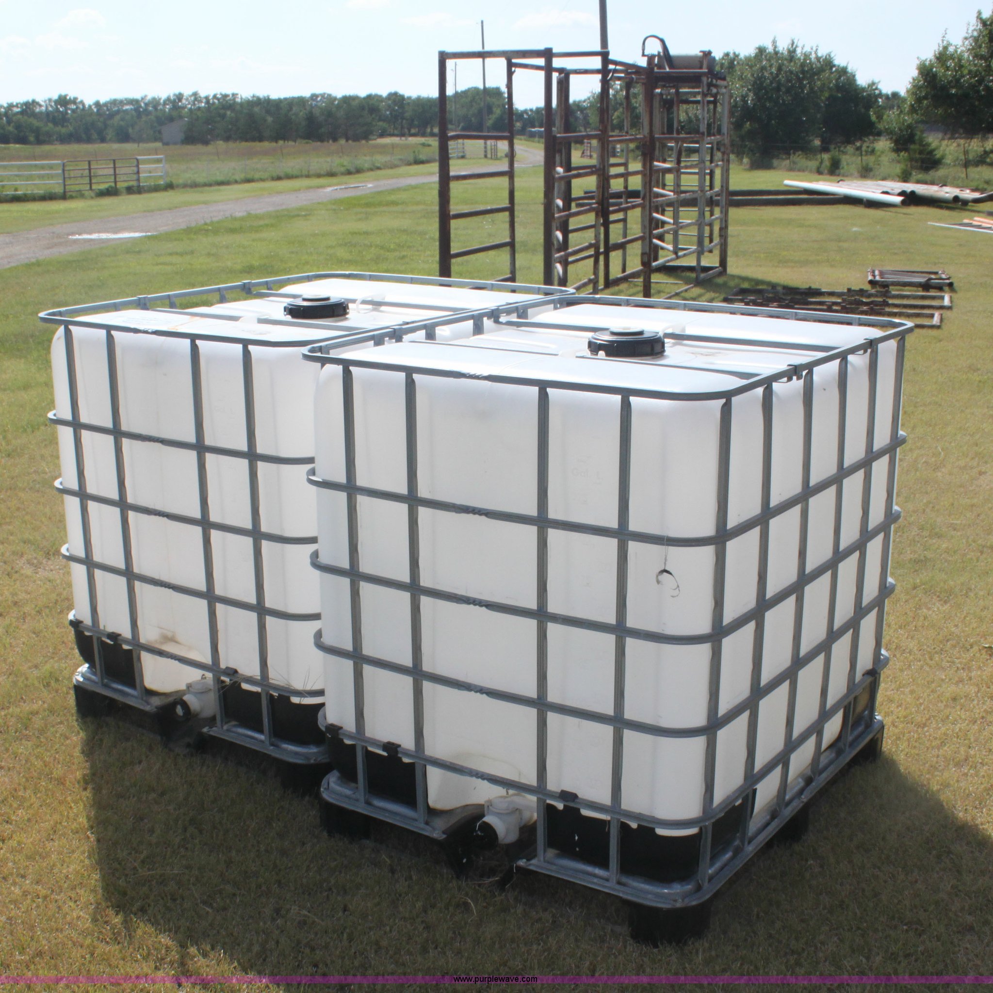 (2) 275 gallon plastic totes in Leon, KS | Item F3279 sold | Purple Wave