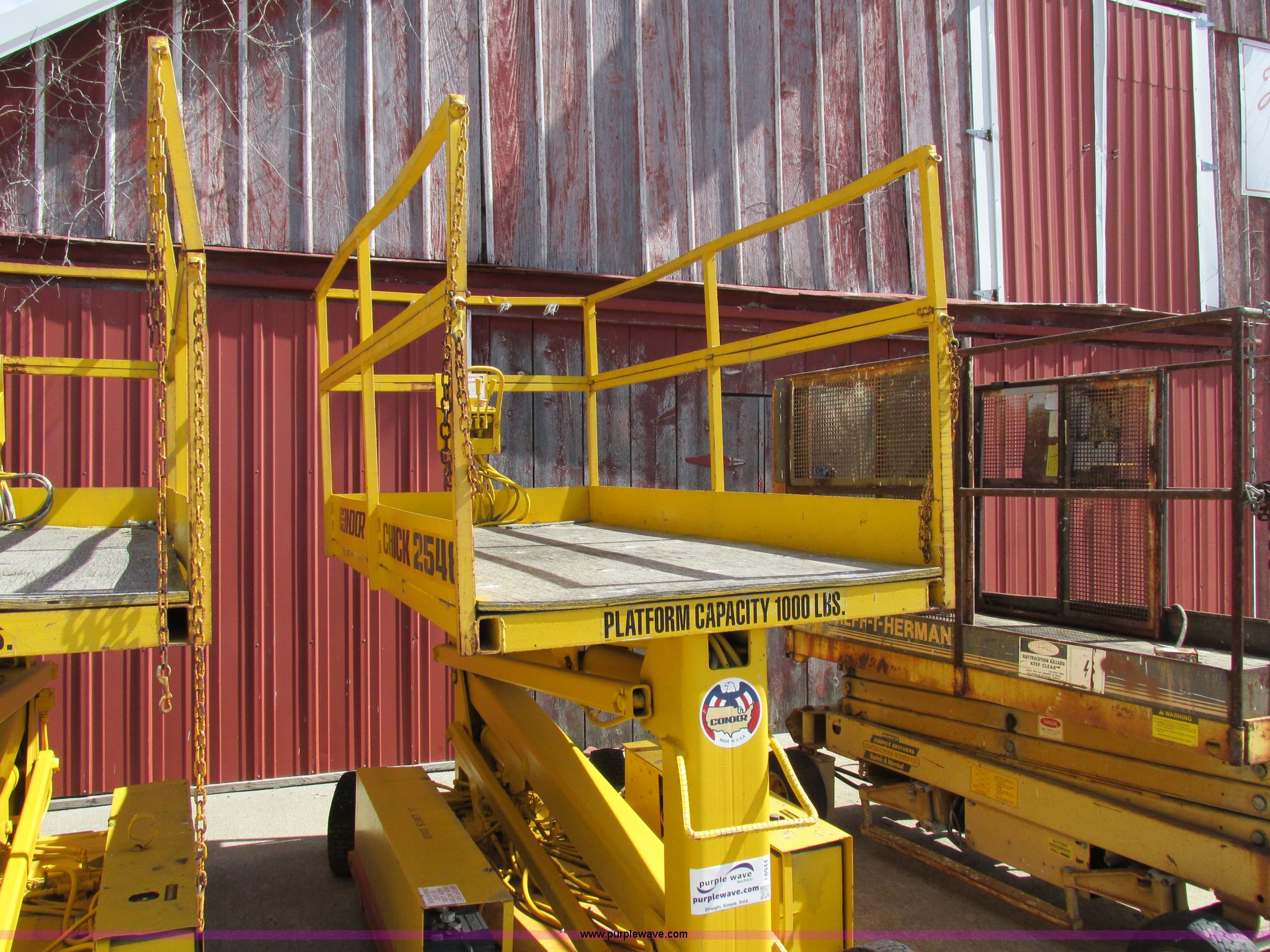 Condor 2548 scissor lift in Columbia, MO | Item I8944 sold | Purple Wave