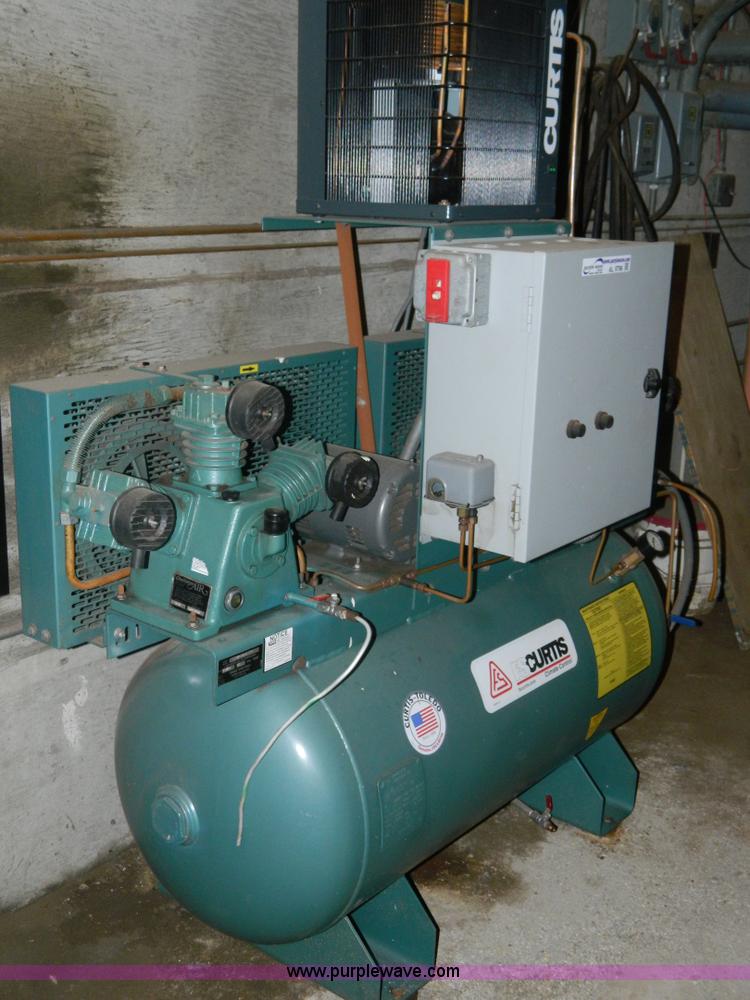 Curtis air compressor in Colby, KS | Item AL9796 sold | Purple Wave
