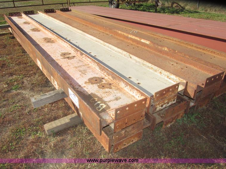 (8) red iron I-beams in Falls City, NE | Item G9896 sold | Purple Wave