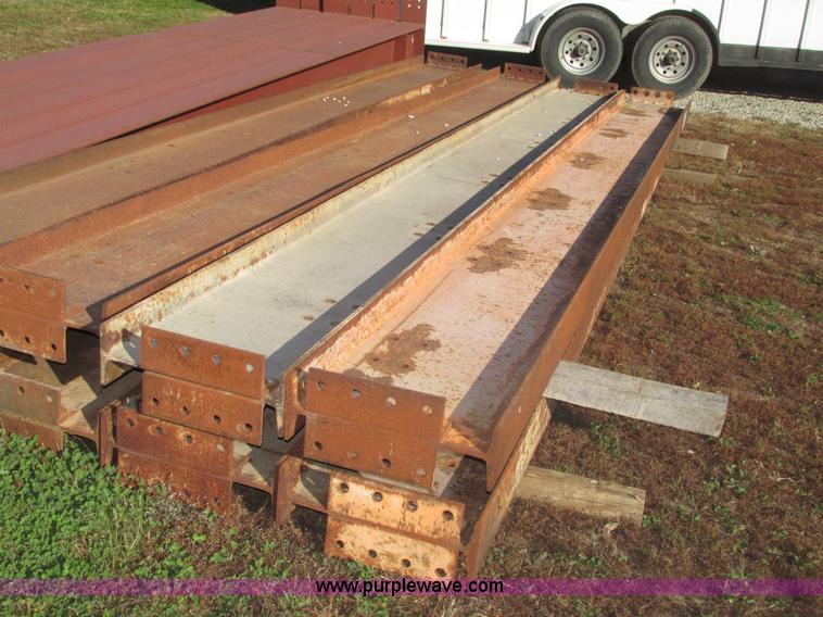 (8) red iron I-beams in Falls City, NE | Item G9896 sold | Purple Wave