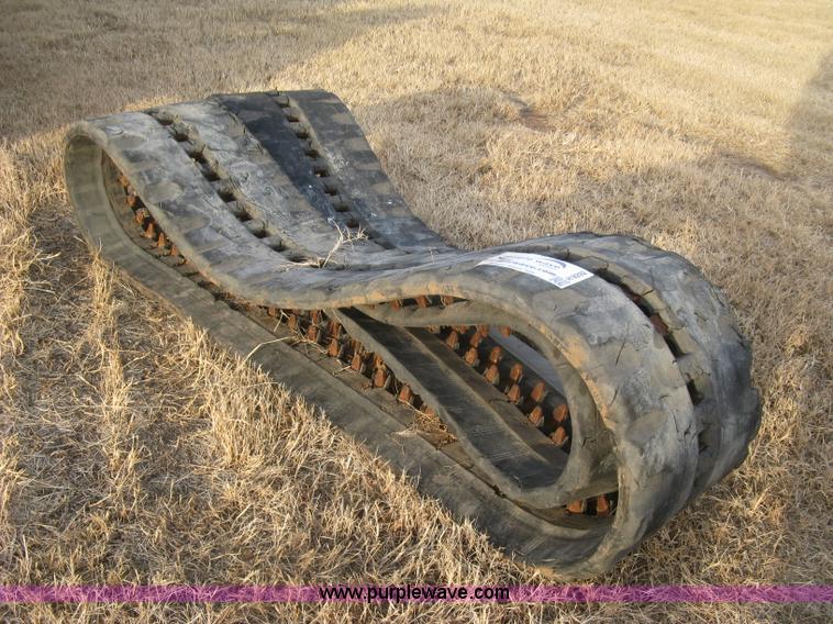Rubber skid steer tracks in Lyons, KS | Item H9292 sold | Purple Wave