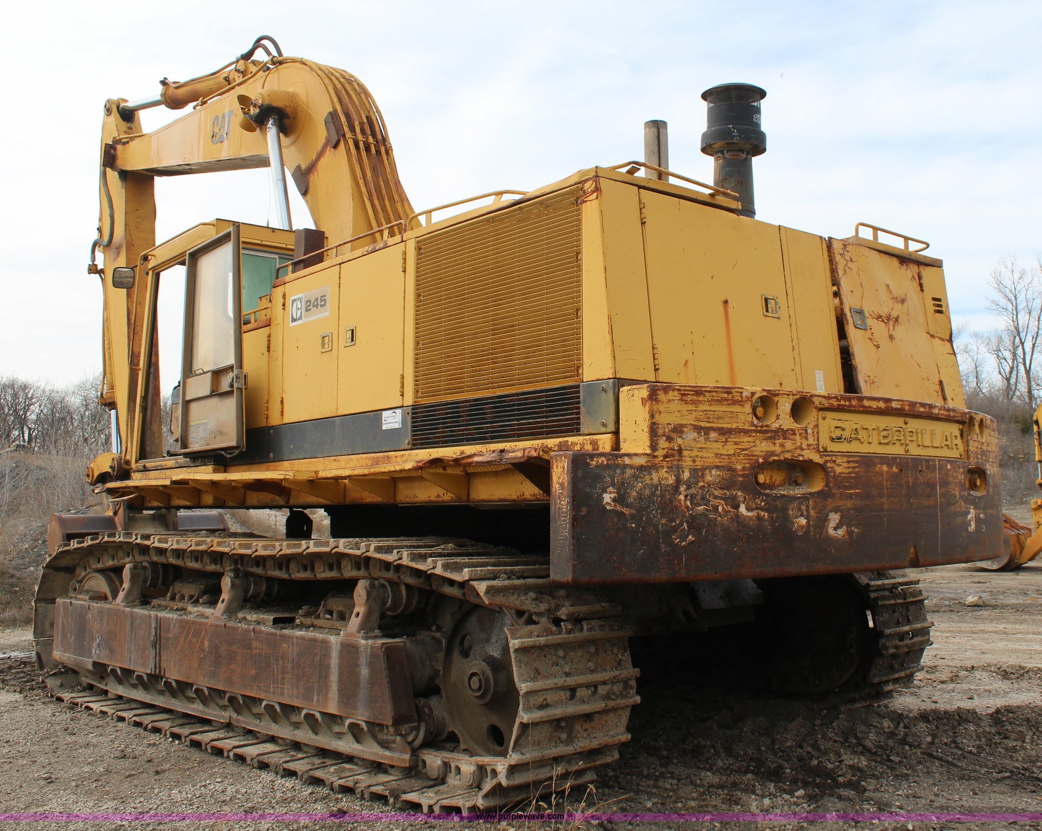 1984 Caterpillar 245 excavator in Ottawa, KS | Item K7101 sold | Purple ...