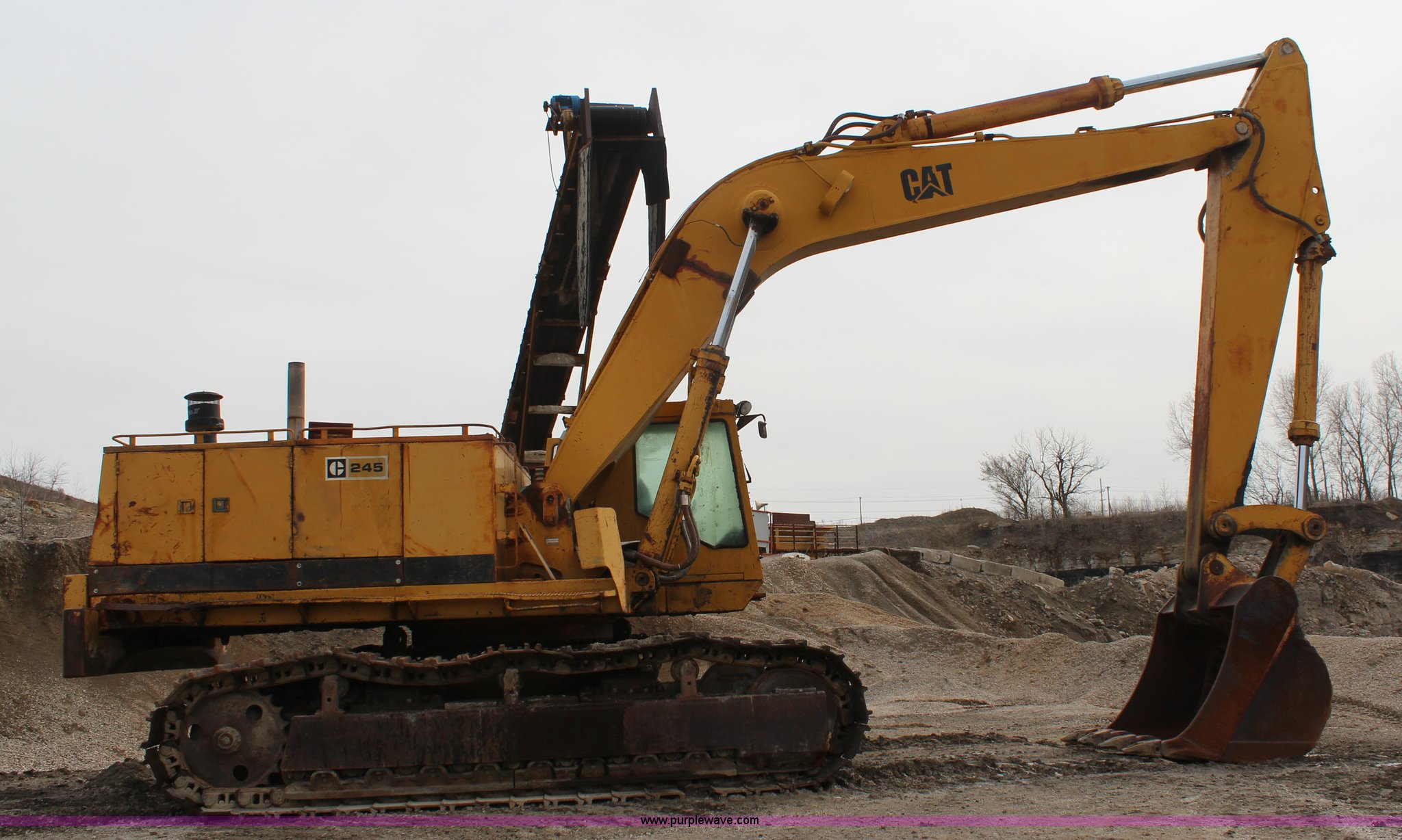 1984 Caterpillar 245 excavator in Ottawa, KS | Item K7101 sold | Purple ...