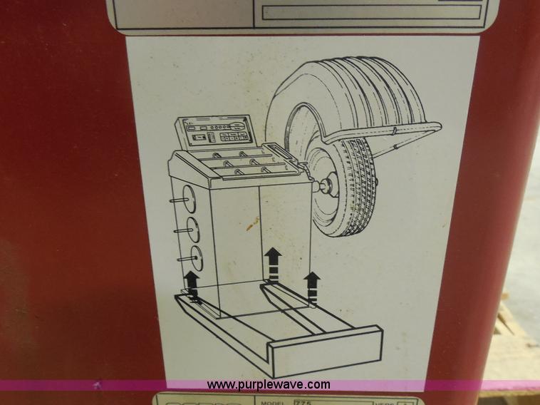 Coats 775 tire balancer in Wichita, KS | Item E6323 sold | Purple Wave