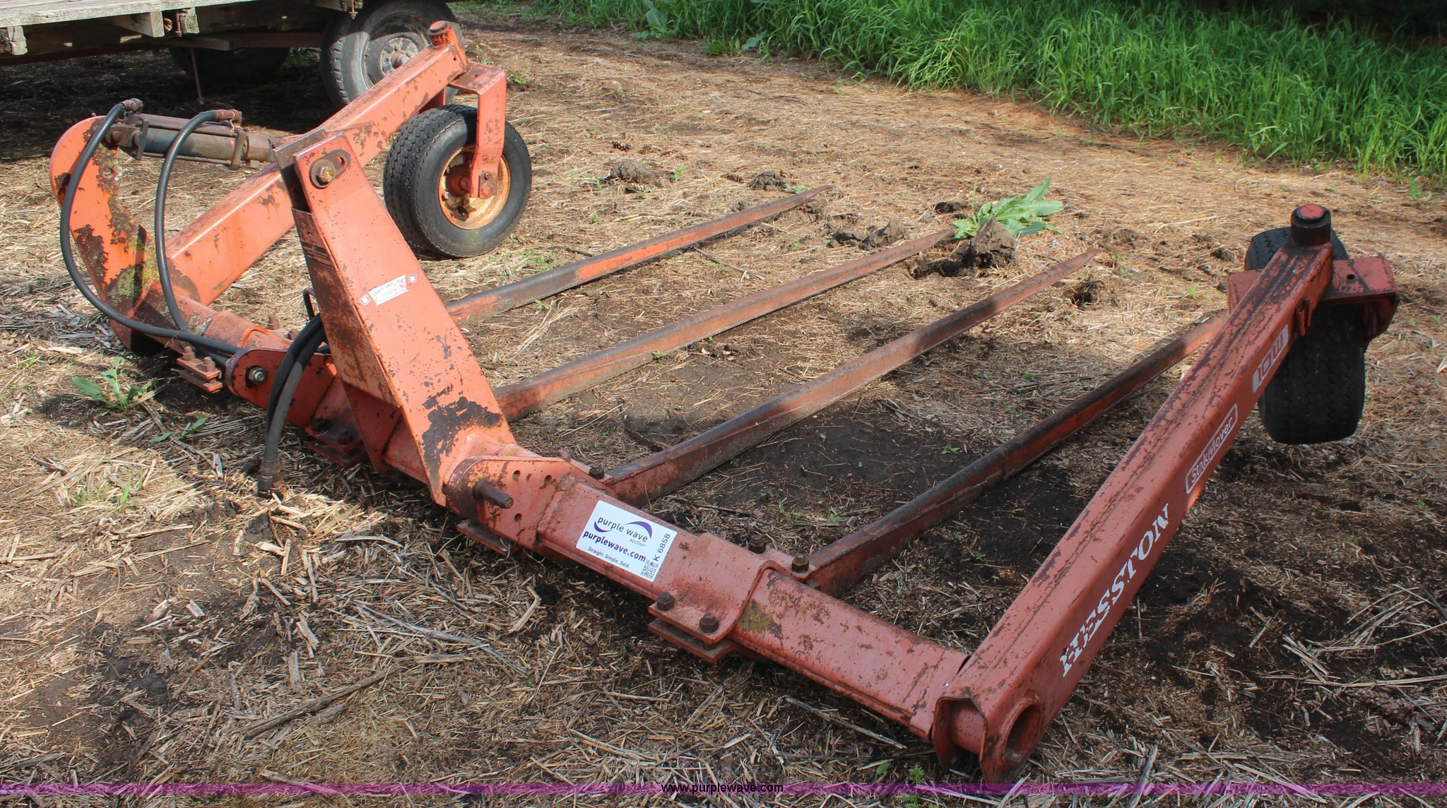 Hesston 10W stack mover in Sabetha, KS | Item K6858 sold | Purple Wave