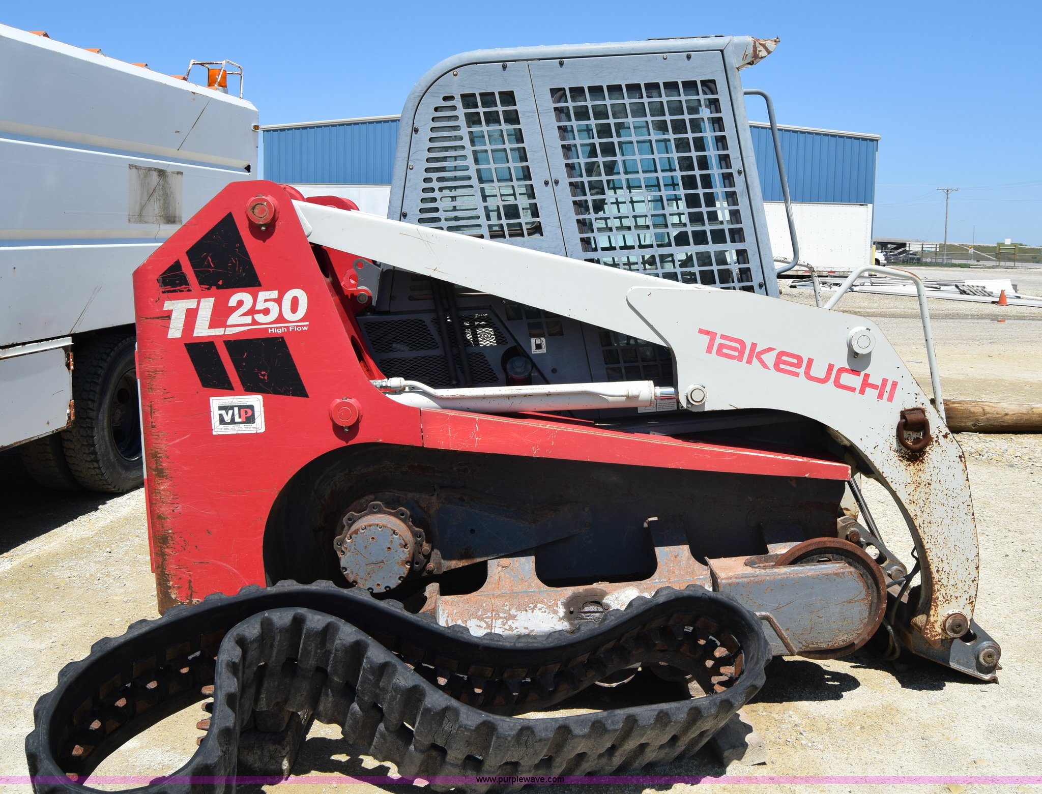 Takeuchi TL250 skid steer in Hutchinson, KS | Item E6345 sold | Purple Wave