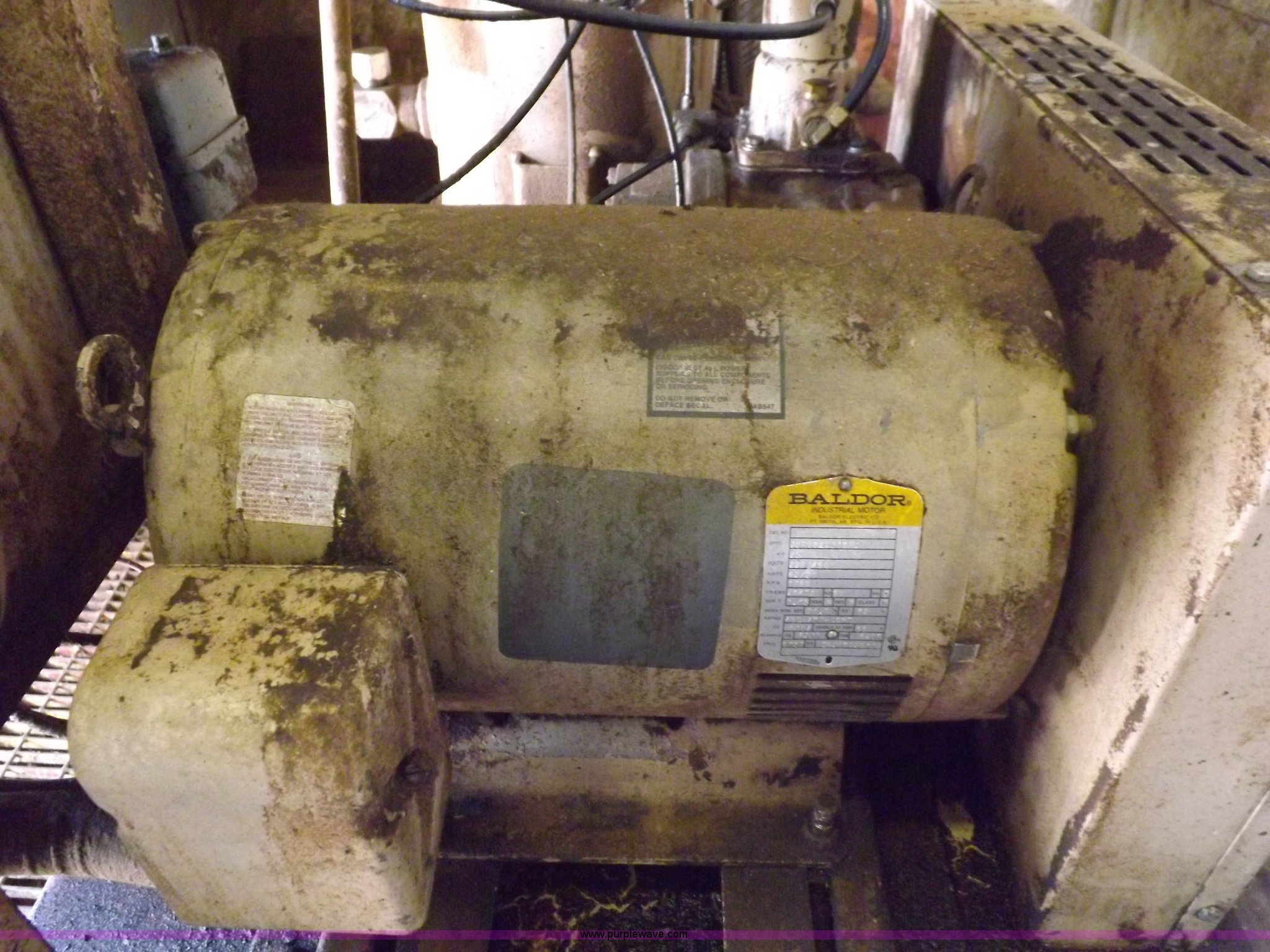 Curtis air compressor in Kismet, KS | Item K3984 sold | Purple Wave