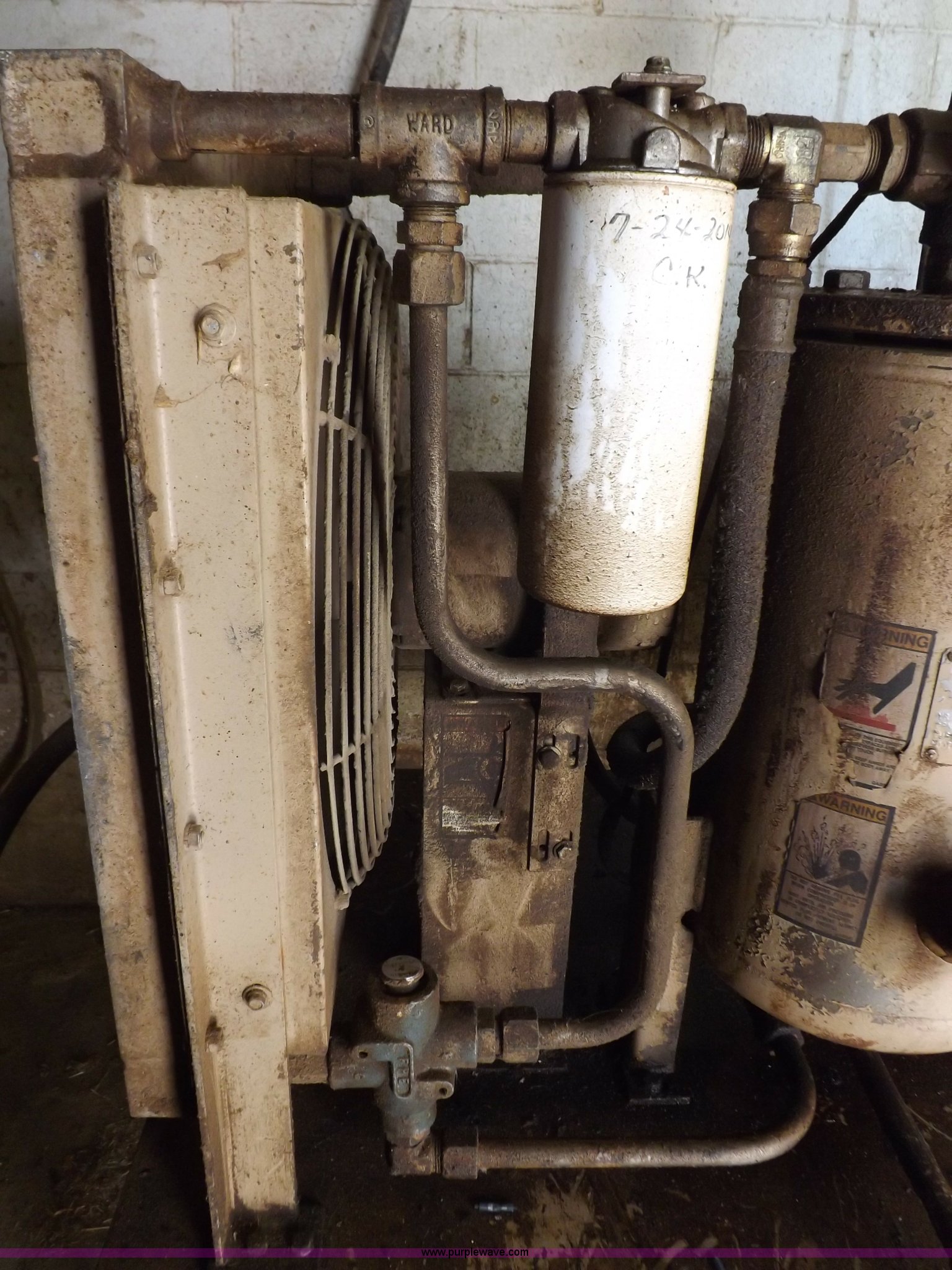 Curtis air compressor in Kismet, KS | Item K3984 sold | Purple Wave