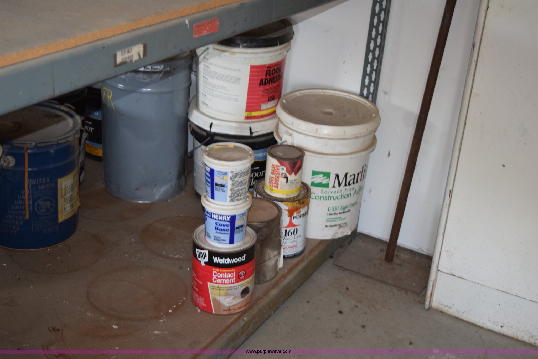 Assorted tile adhesive in Salina, KS | Item BG9901 sold | Purple Wave