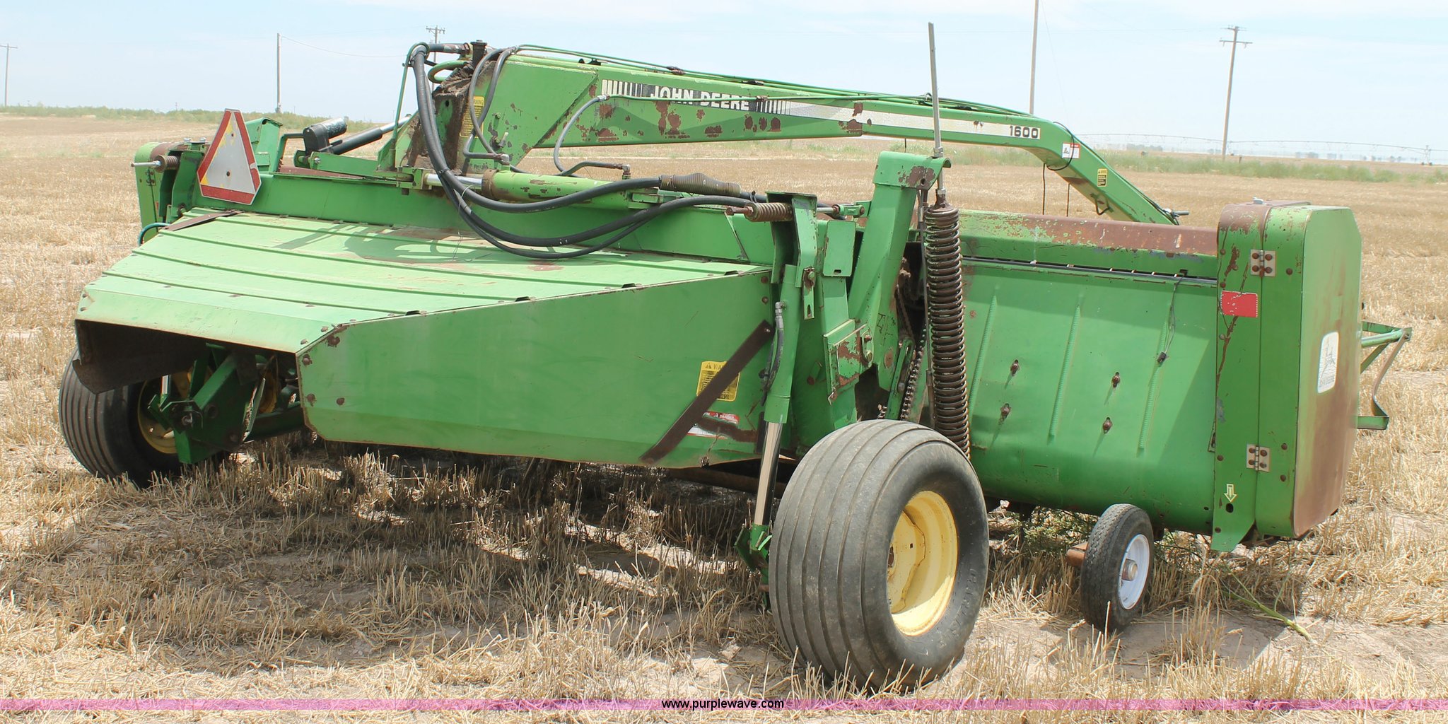 1991 John Deere 1600 pull type windrower in Hereford, TX | Item L4338 ...