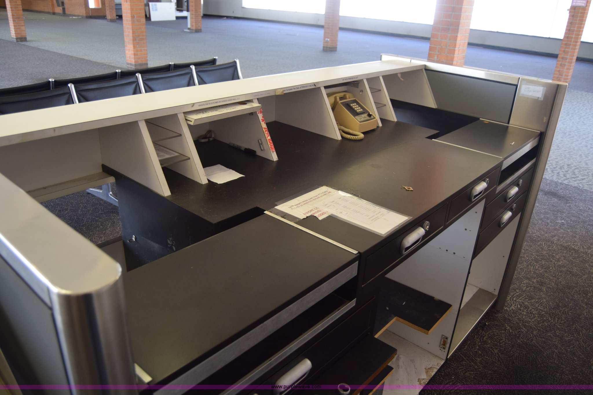 (2) airline gate counters in Wichita, KS | Item BR9681 sold | Purple Wave