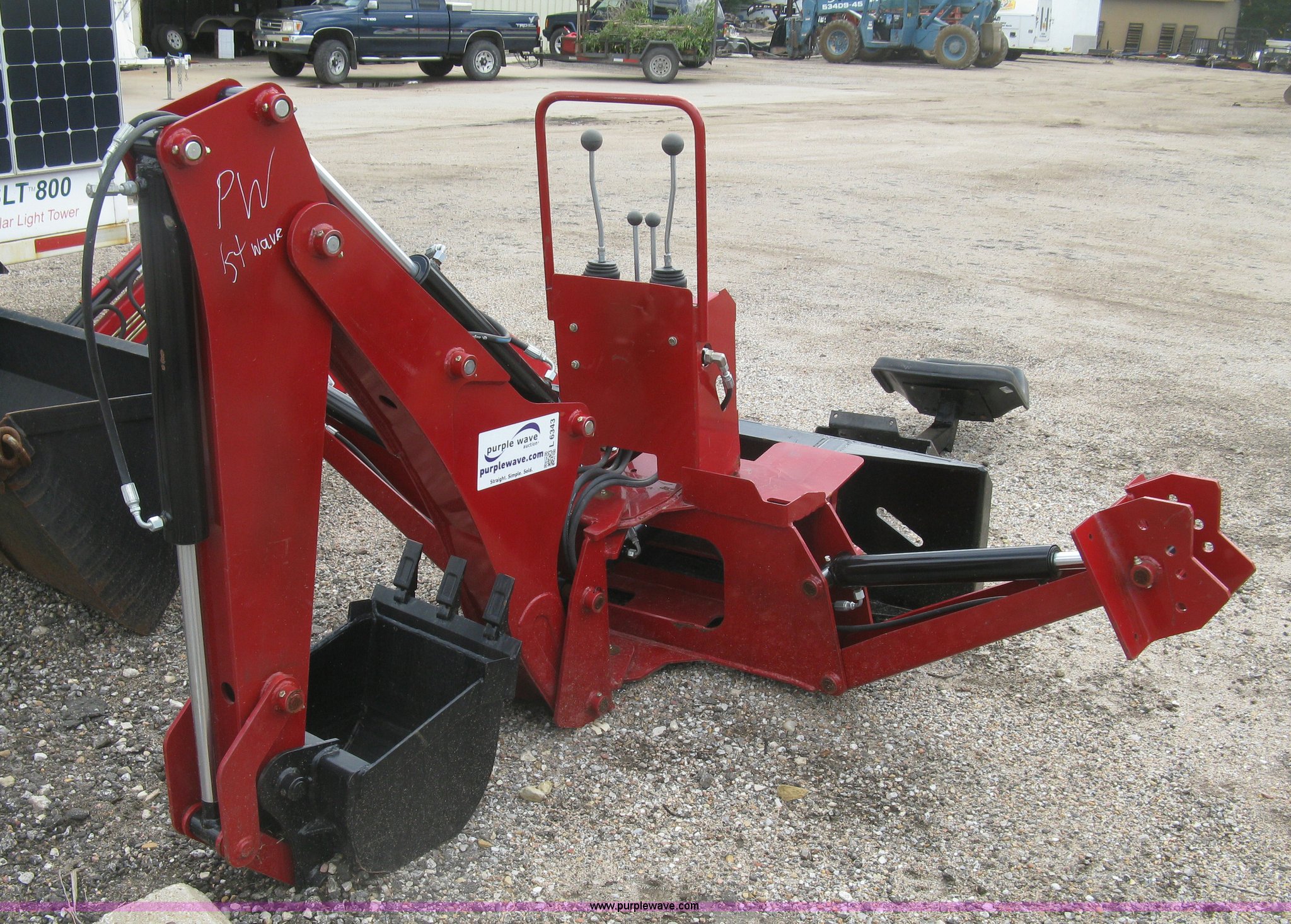 Compact backhoe attachment in Wichita, KS | Item L6343 sold | Purple Wave