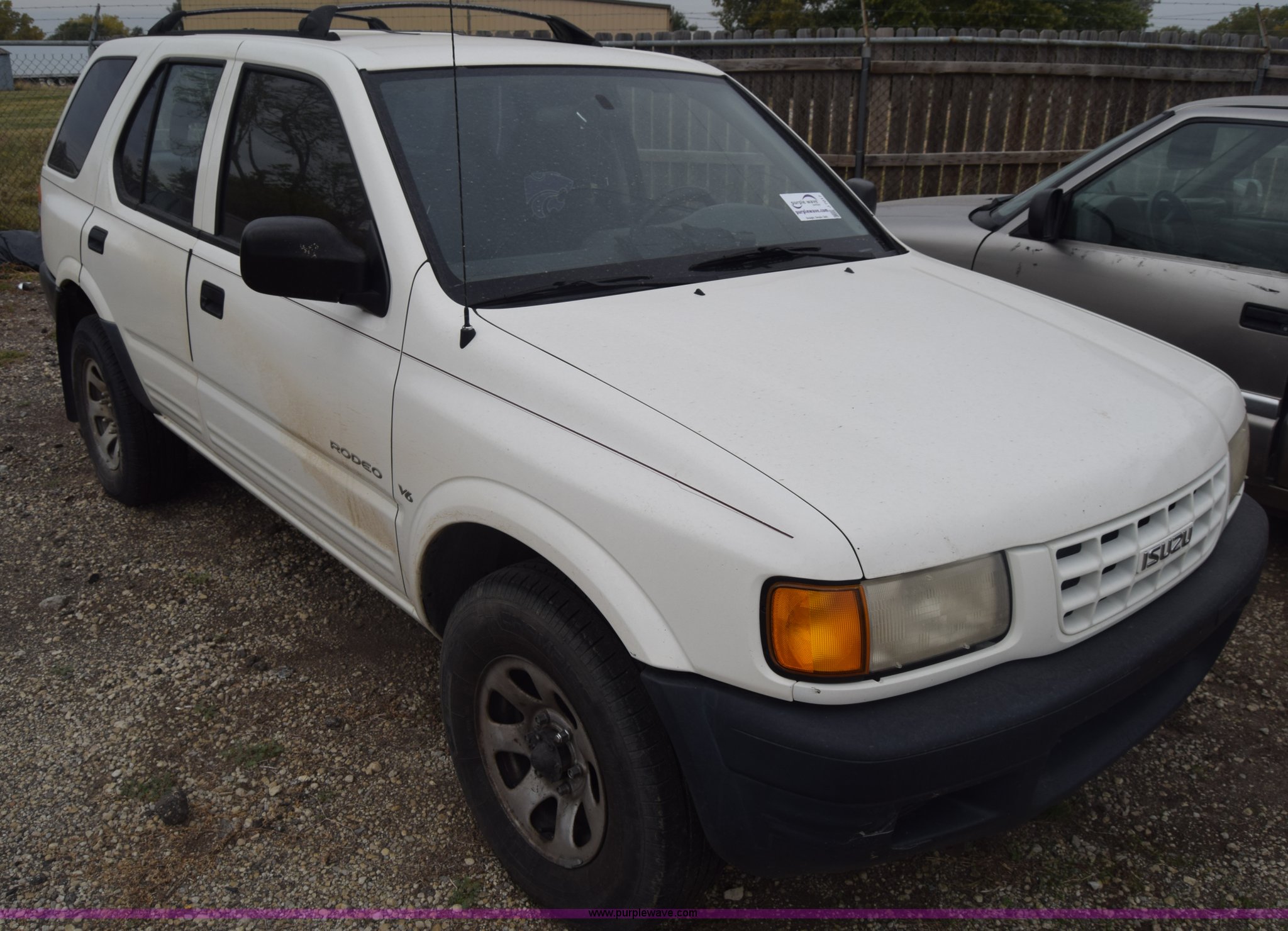 1999 Isuzu Rodeo SUV in McPherson, KS | Item J7017 sold | Purple Wave