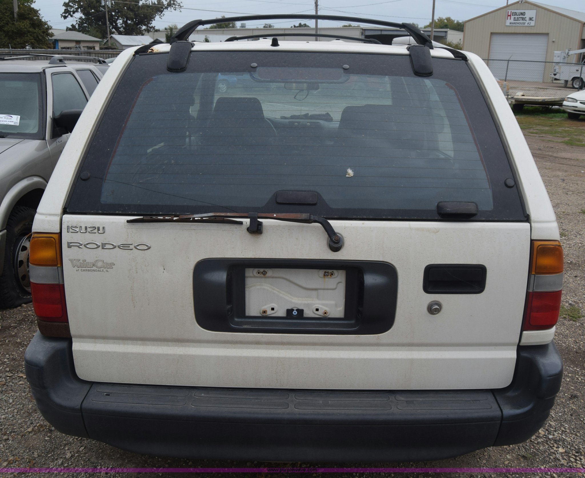 1999 Isuzu Rodeo SUV in McPherson, KS | Item J7017 sold | Purple Wave