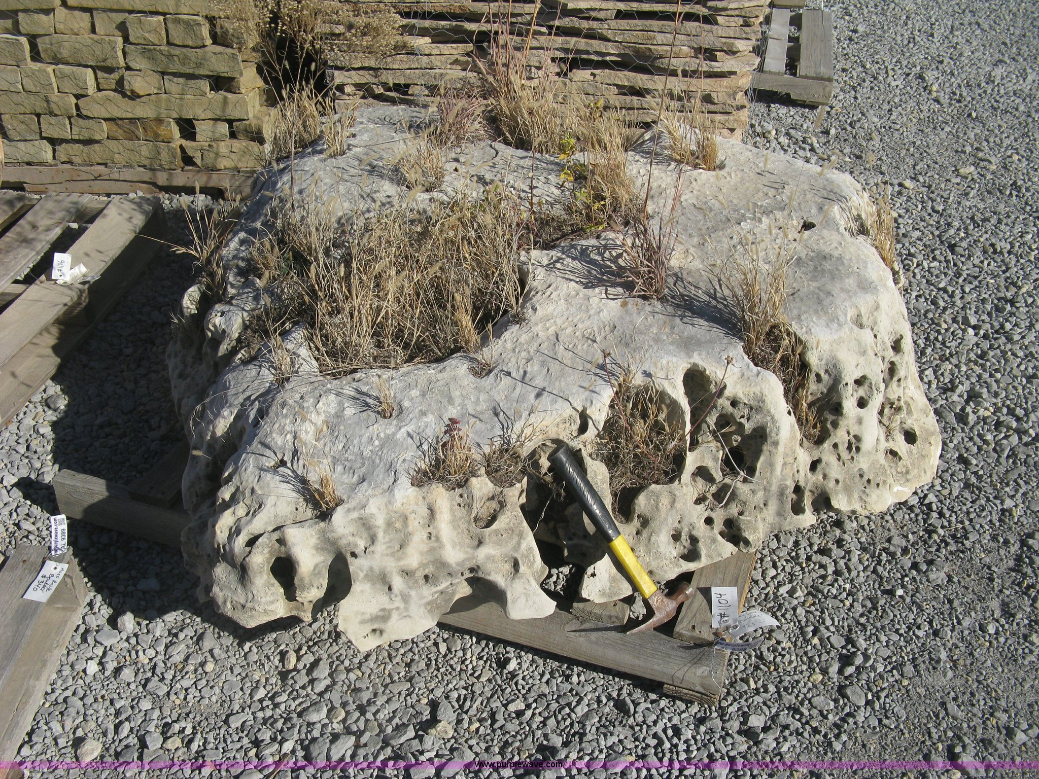 Holey limestone boulder in Wichita, KS | Item AL9388 sold | Purple Wave