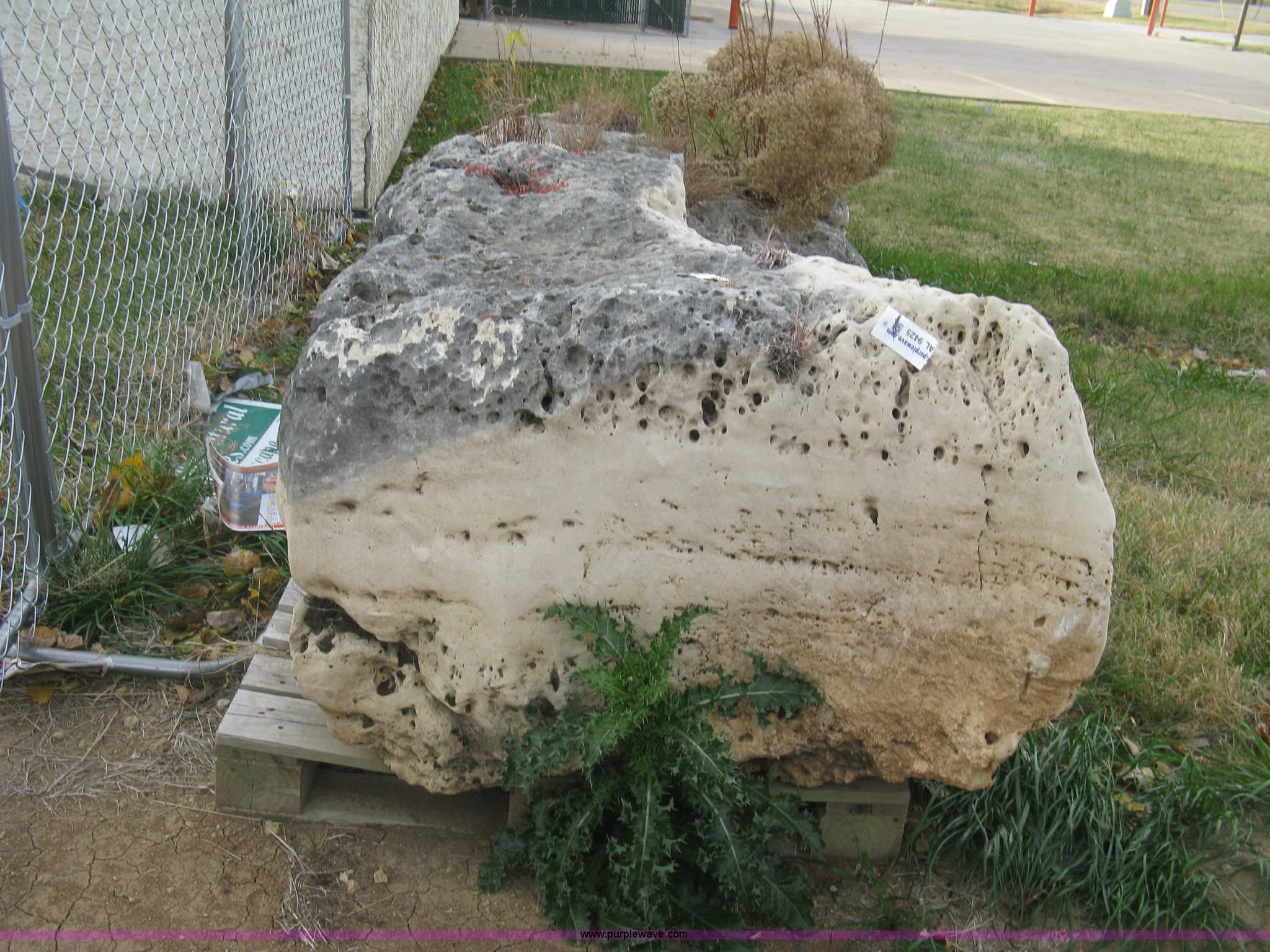 Holey limestone boulder in Wichita, KS | Item AL9425 sold | Purple Wave