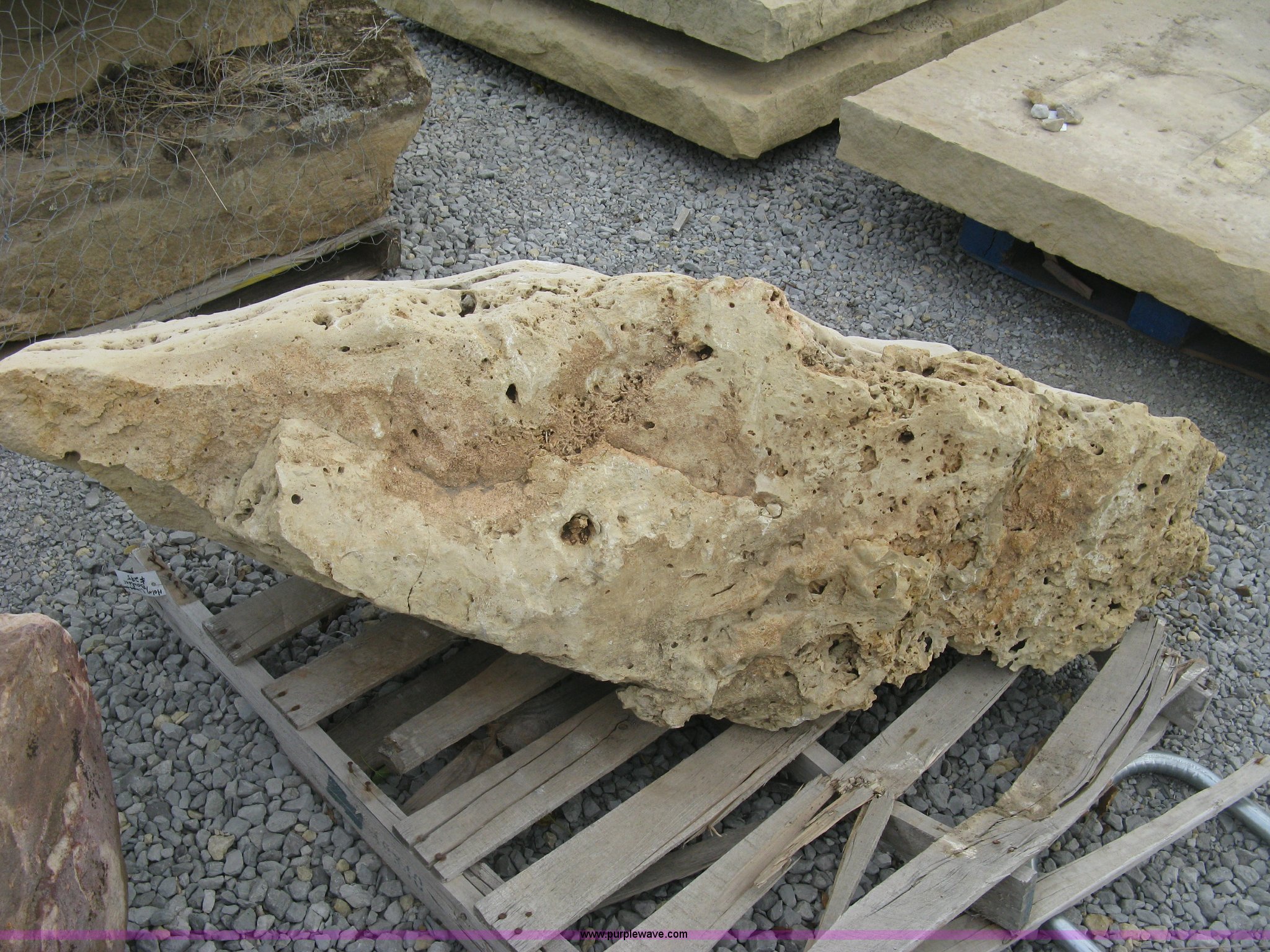 Holey limestone boulder in Wichita, KS | Item AL9475 sold | Purple Wave