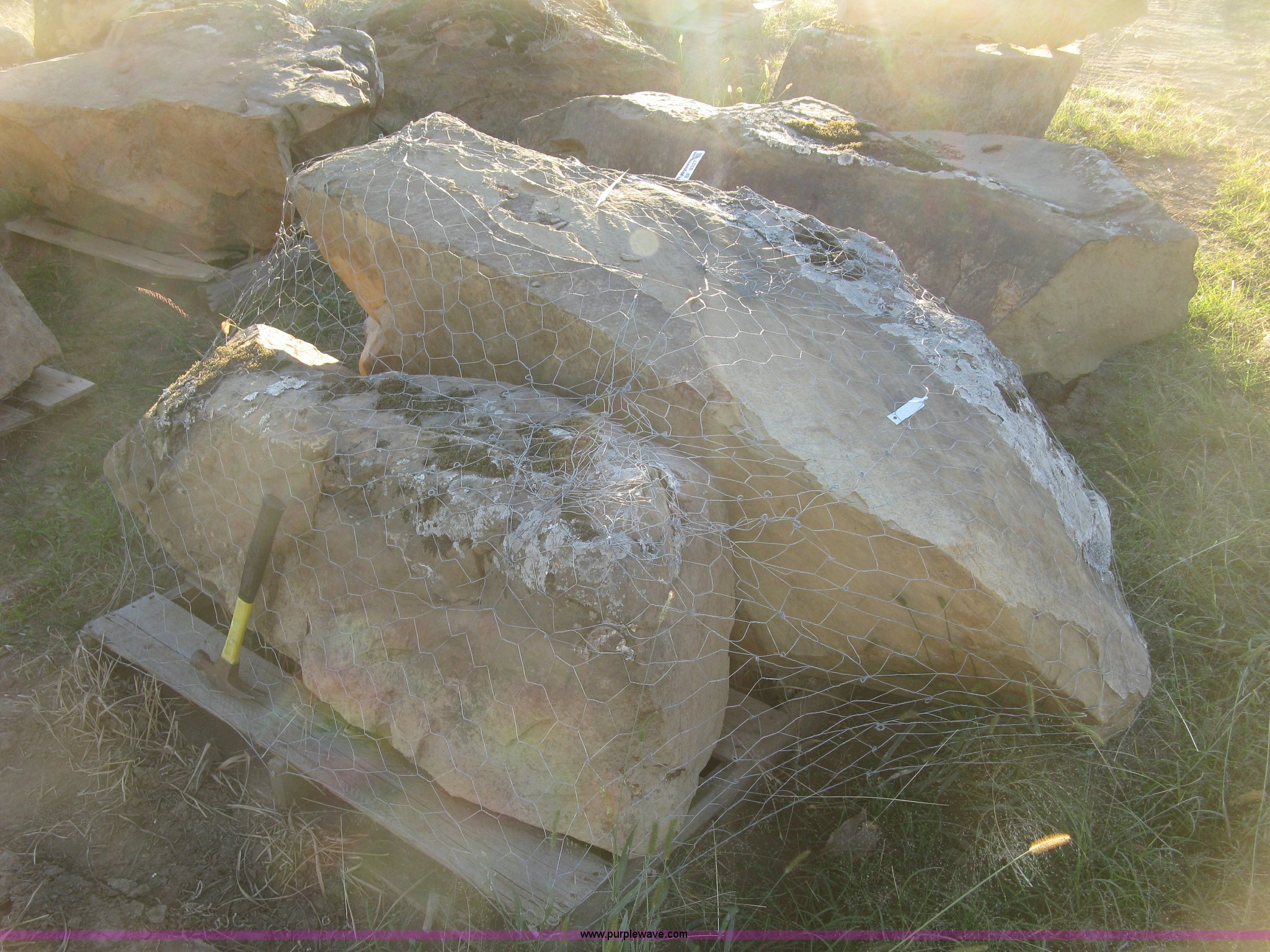 (2) moss rock boulders in Wichita, KS | Item BF9327 sold | Purple Wave
