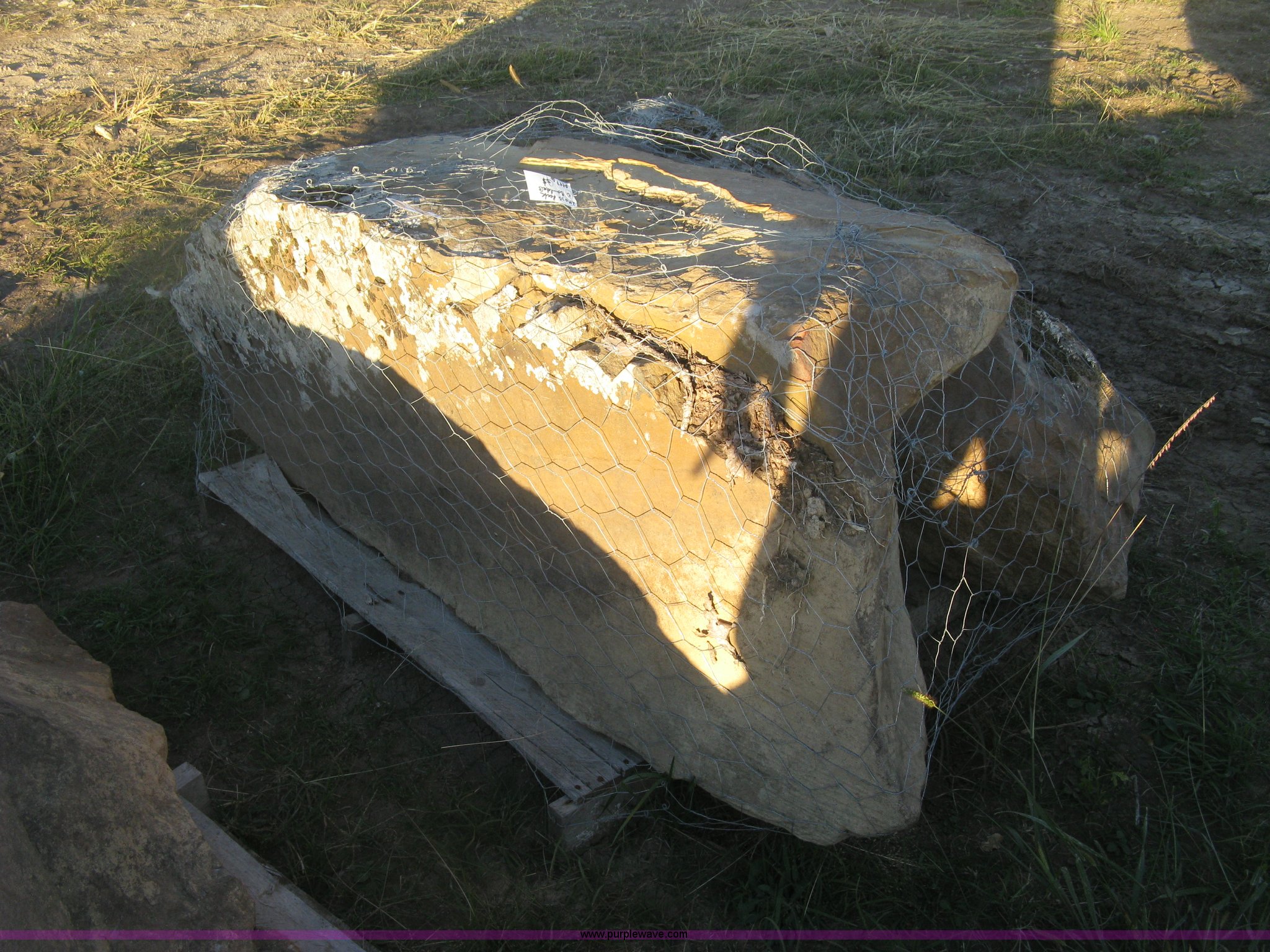 (2) moss rock boulders in Wichita, KS | Item BF9327 sold | Purple Wave