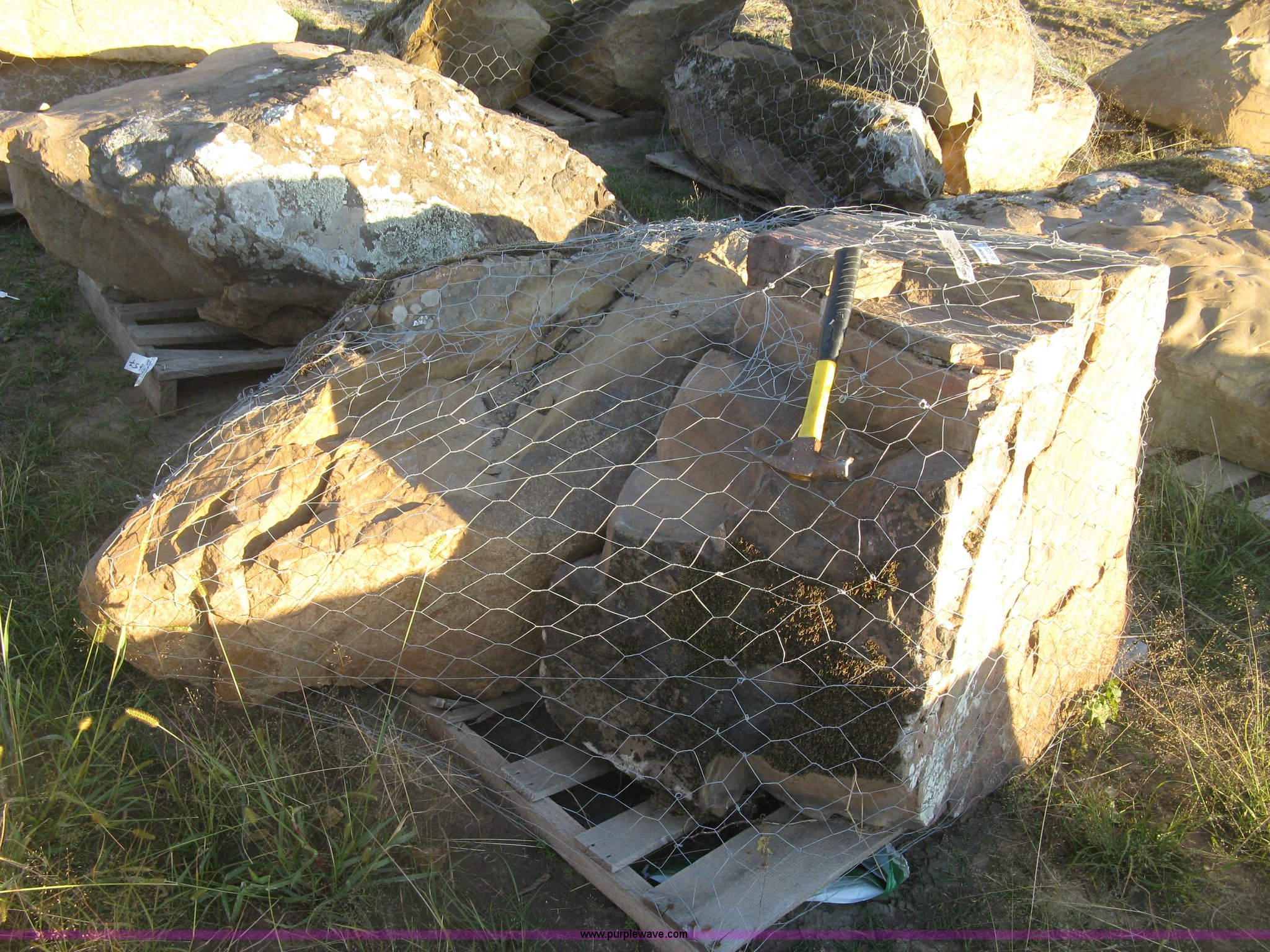 (2) moss rock boulders in Wichita, KS | Item BF9330 sold | Purple Wave