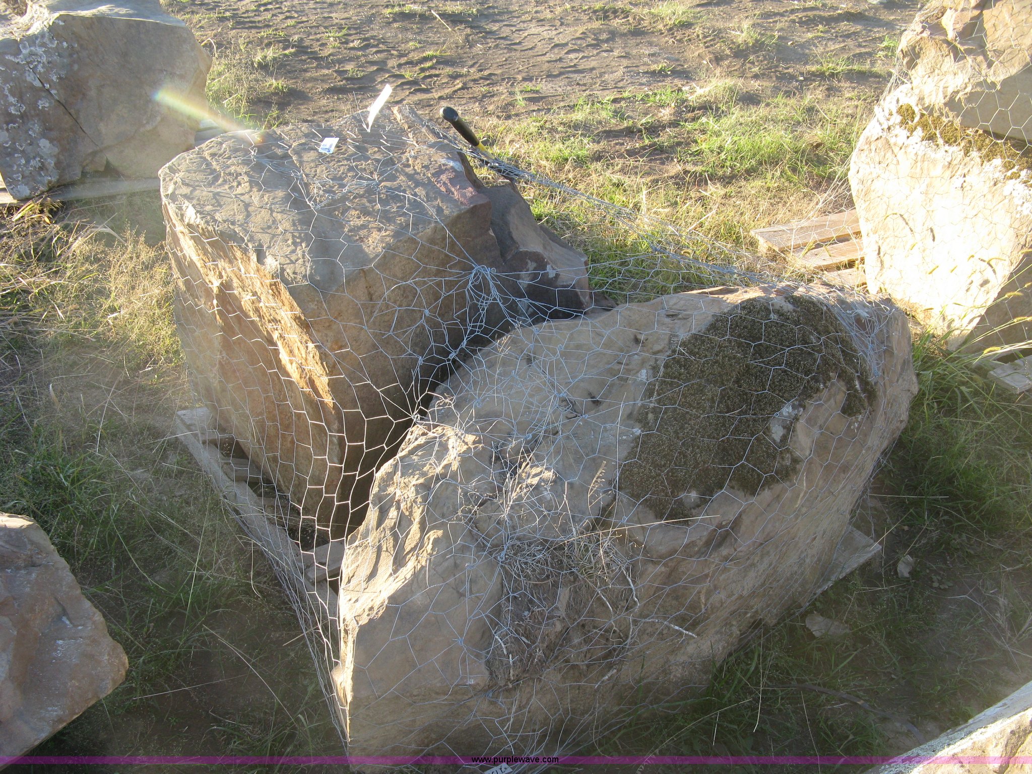 (2) moss rock boulders in Wichita, KS | Item BF9330 sold | Purple Wave