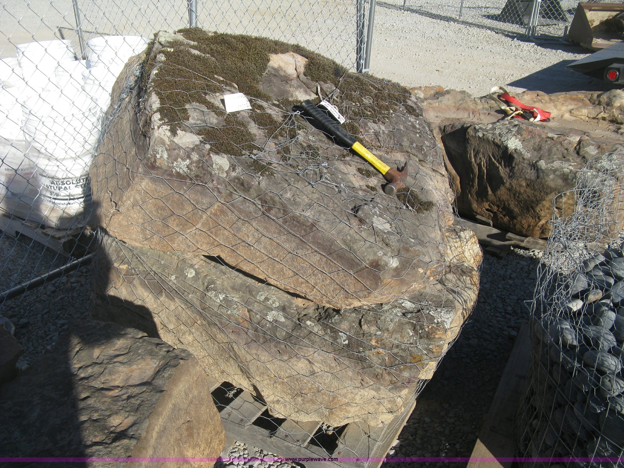 (2) moss rock boulders in Wichita, KS | Item BF9447 sold | Purple Wave