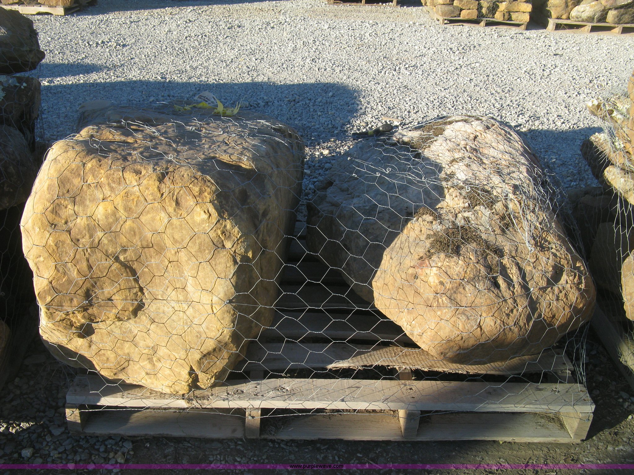 (2) moss rocks boulders in Wichita, KS | Item BF9698 sold | Purple Wave