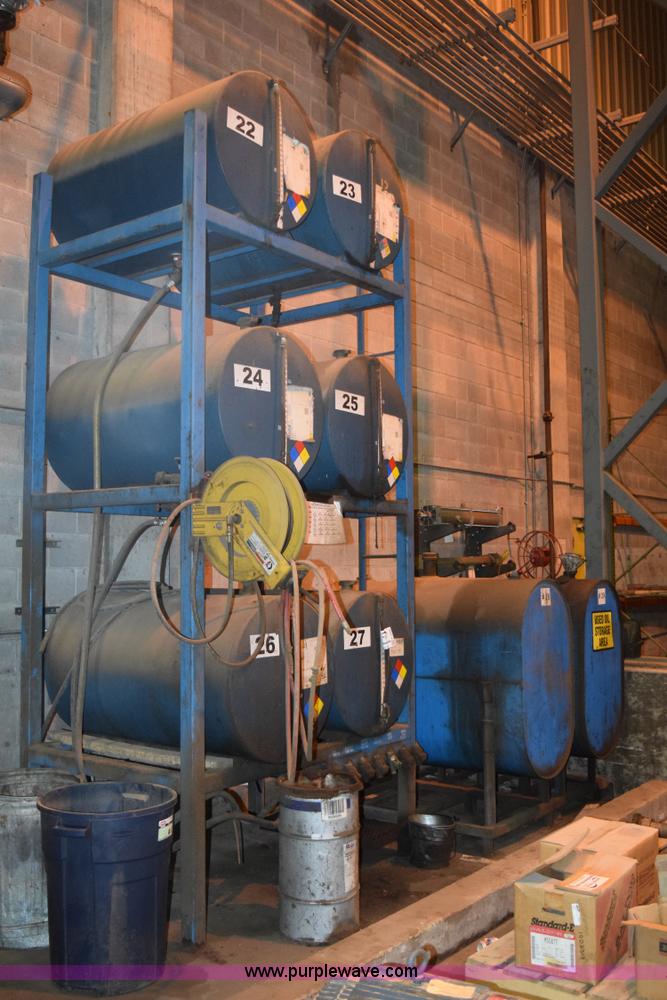 Oil rack with tanks in Cook, MN | Item K3456 sold | Purple Wave