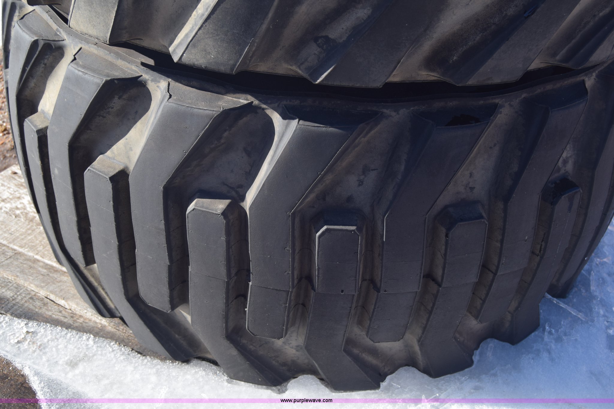 (2) Titan 33x15.50-16.5 skid steer tires and wheels in Kinsley, KS ...