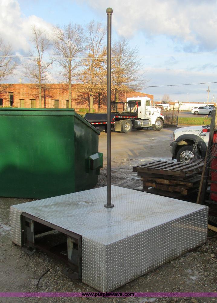 Skid steer platform and flag pole display in Fenton, MO | Item K5245 ...