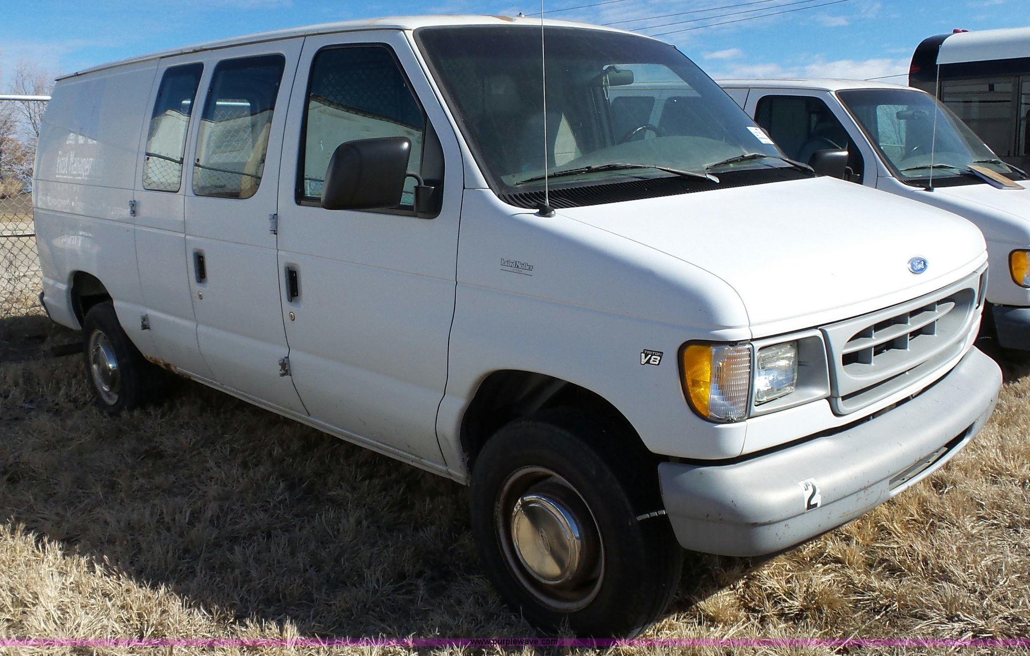 1997 Ford Econoline E250 van in Lawrence, KS | Item L3652 sold | Purple ...