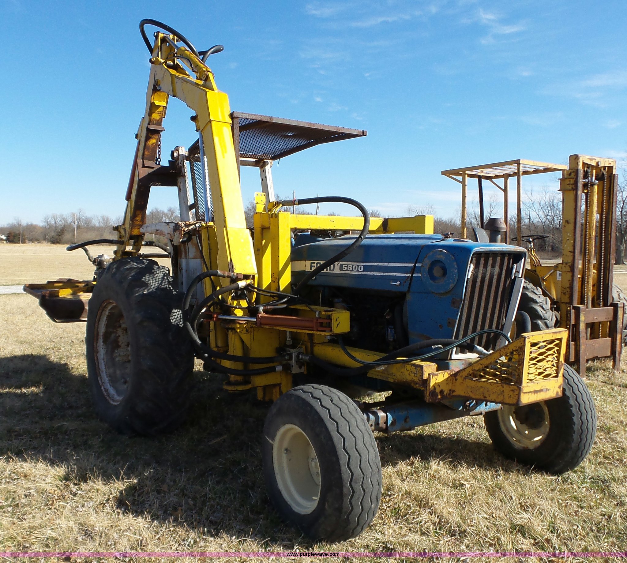 Ford 5600 tractor with side boom mower in Cherryvale, KS | Item L6250 ...
