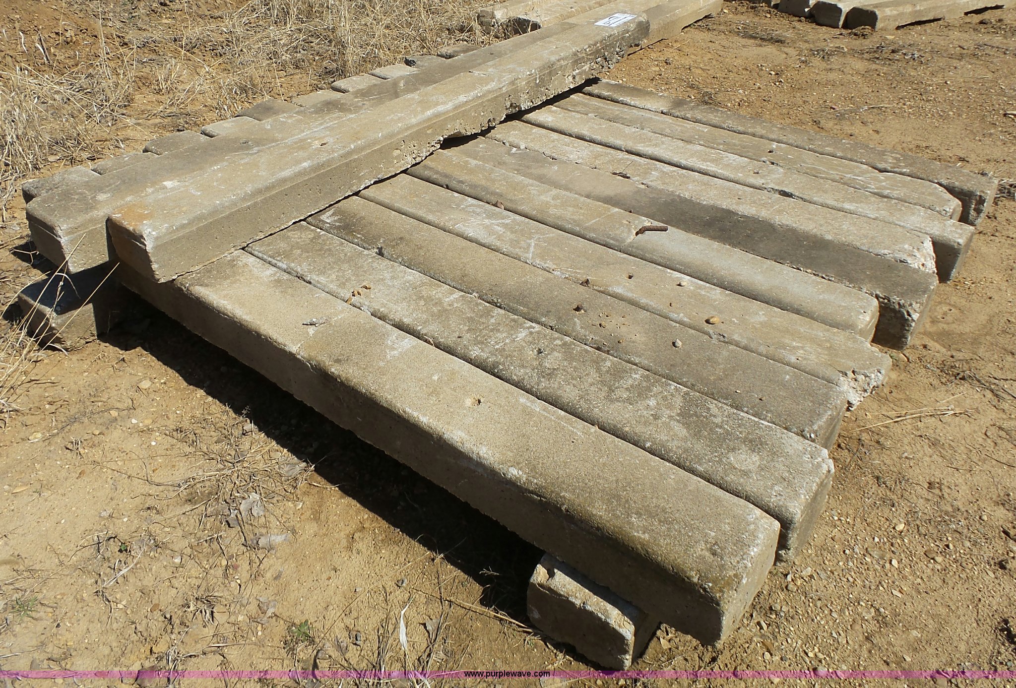 Approximately 30 concrete bumper blocks in Topeka, KS | Item J4231 sold ...