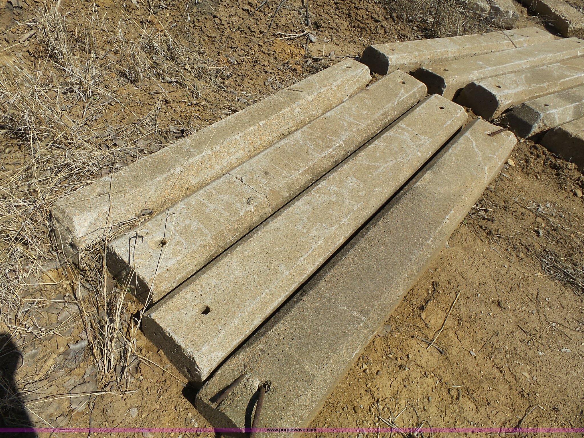 Approximately 30 concrete bumper blocks in Topeka, KS | Item J4231 sold ...