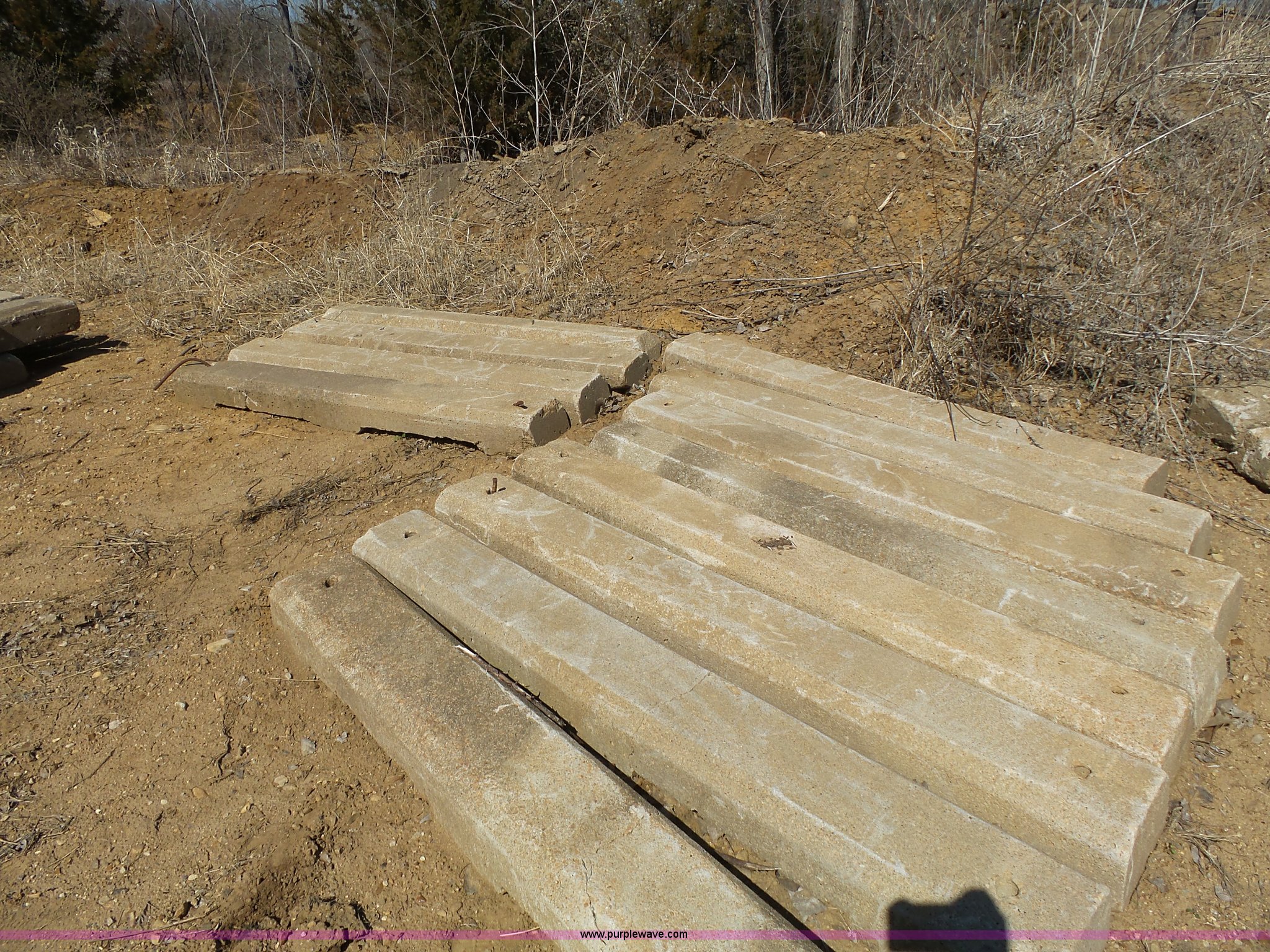 Approximately 30 concrete bumper blocks in Topeka, KS | Item J4231 sold ...