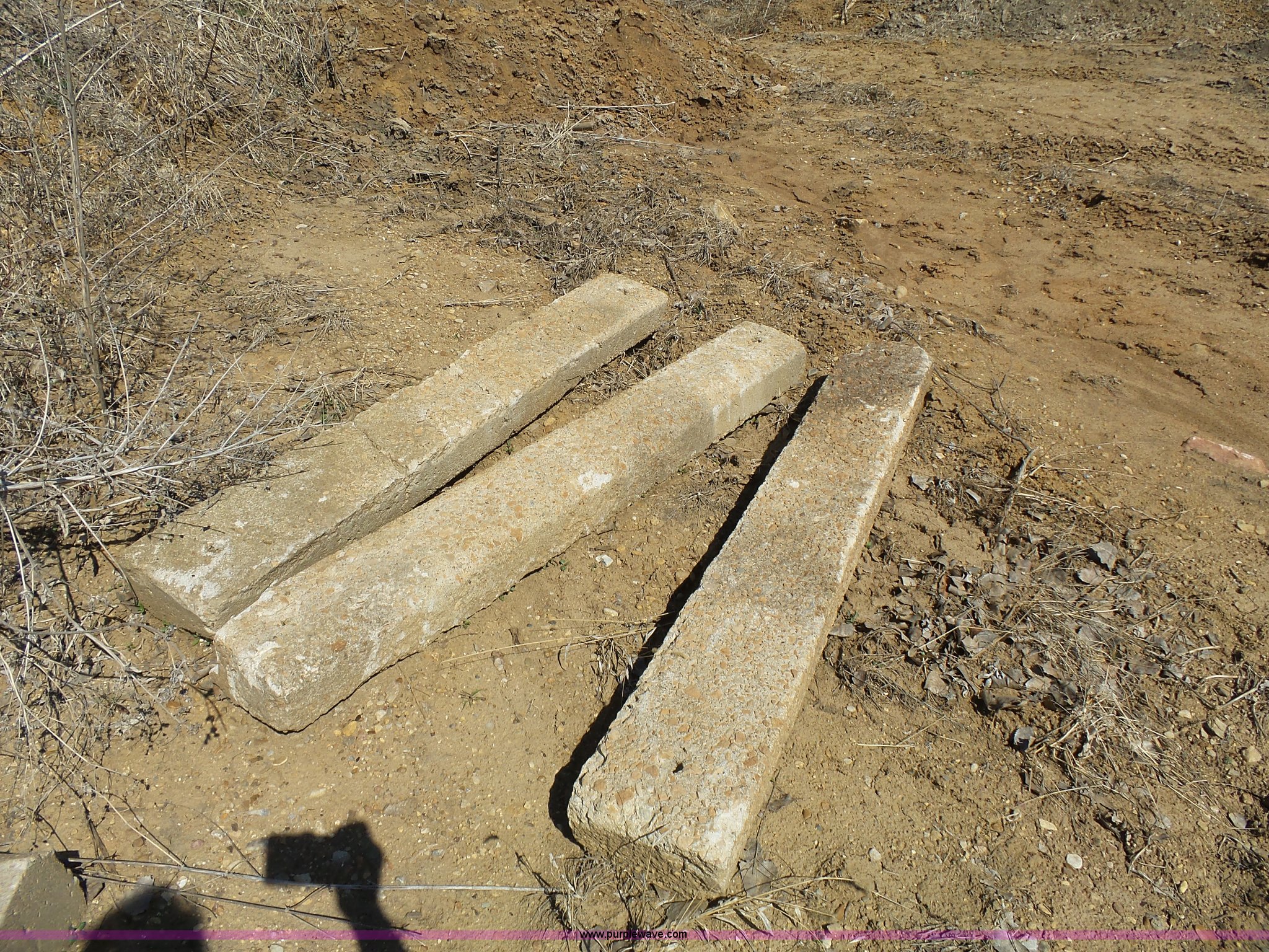 Approximately 30 concrete bumper blocks in Topeka, KS | Item J4231 sold ...