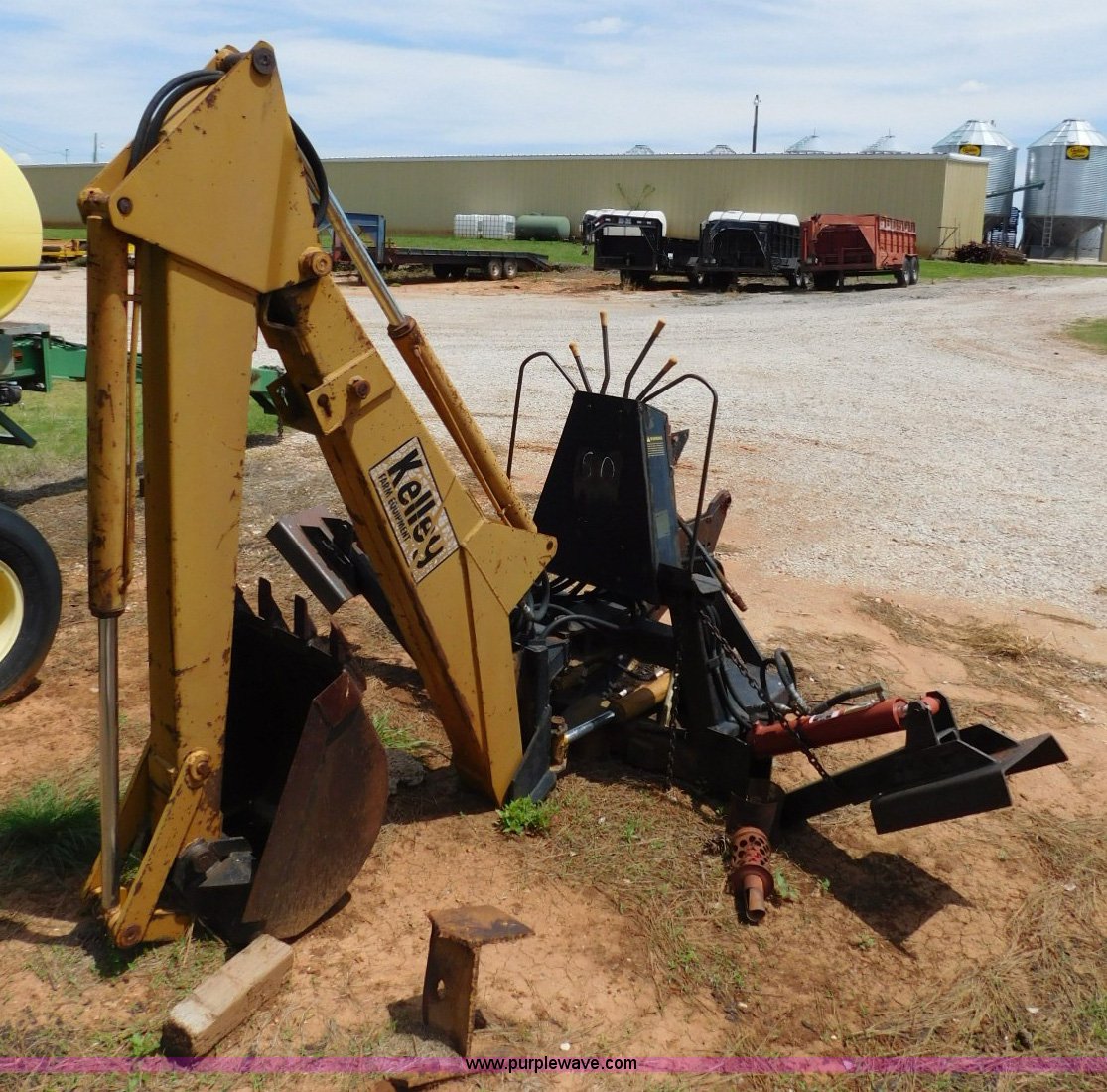 Kelly backhoe attachment in Stillwater, OK | Item AQ9671 sold | Purple Wave