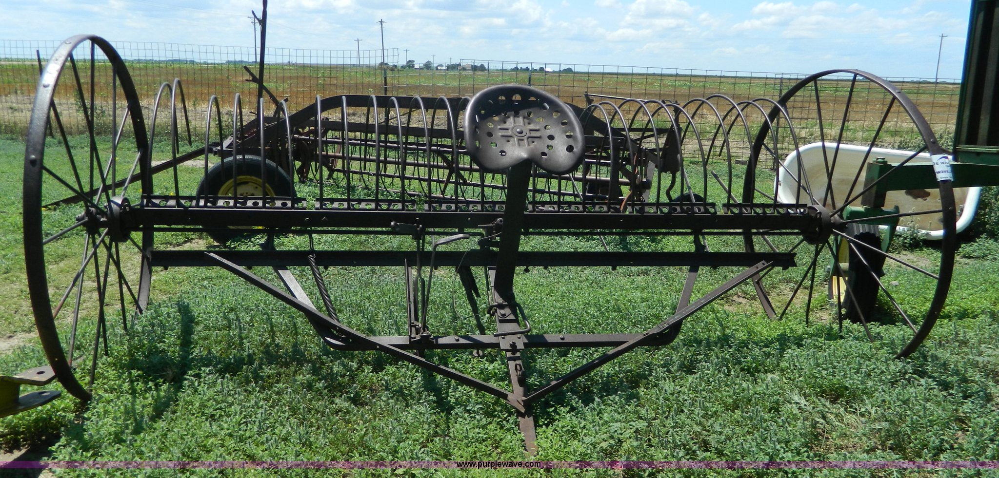 Sulky buck rake in Great Bend, KS | Item J8862 sold | Purple Wave