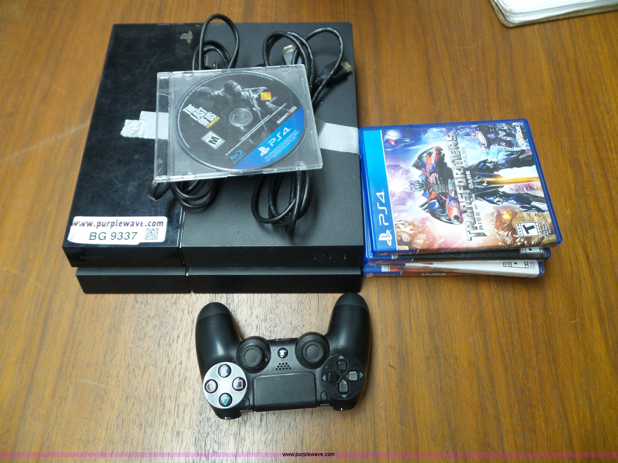 Sony PS4 system with games in Topeka, KS | Item BG9337 sold | Purple Wave